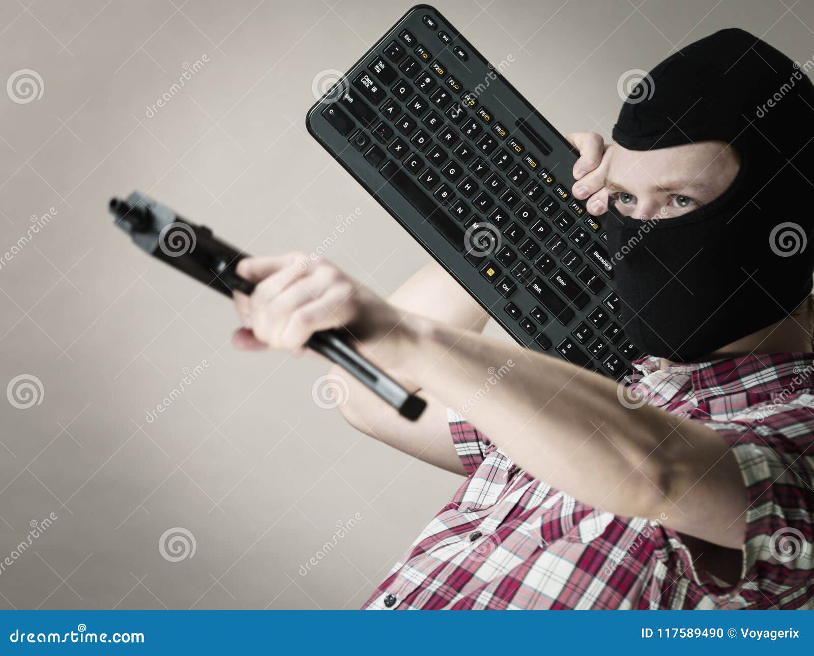 Man in Balaclava Holding Keyboard and Gun Stock Photo - Image of speech ...