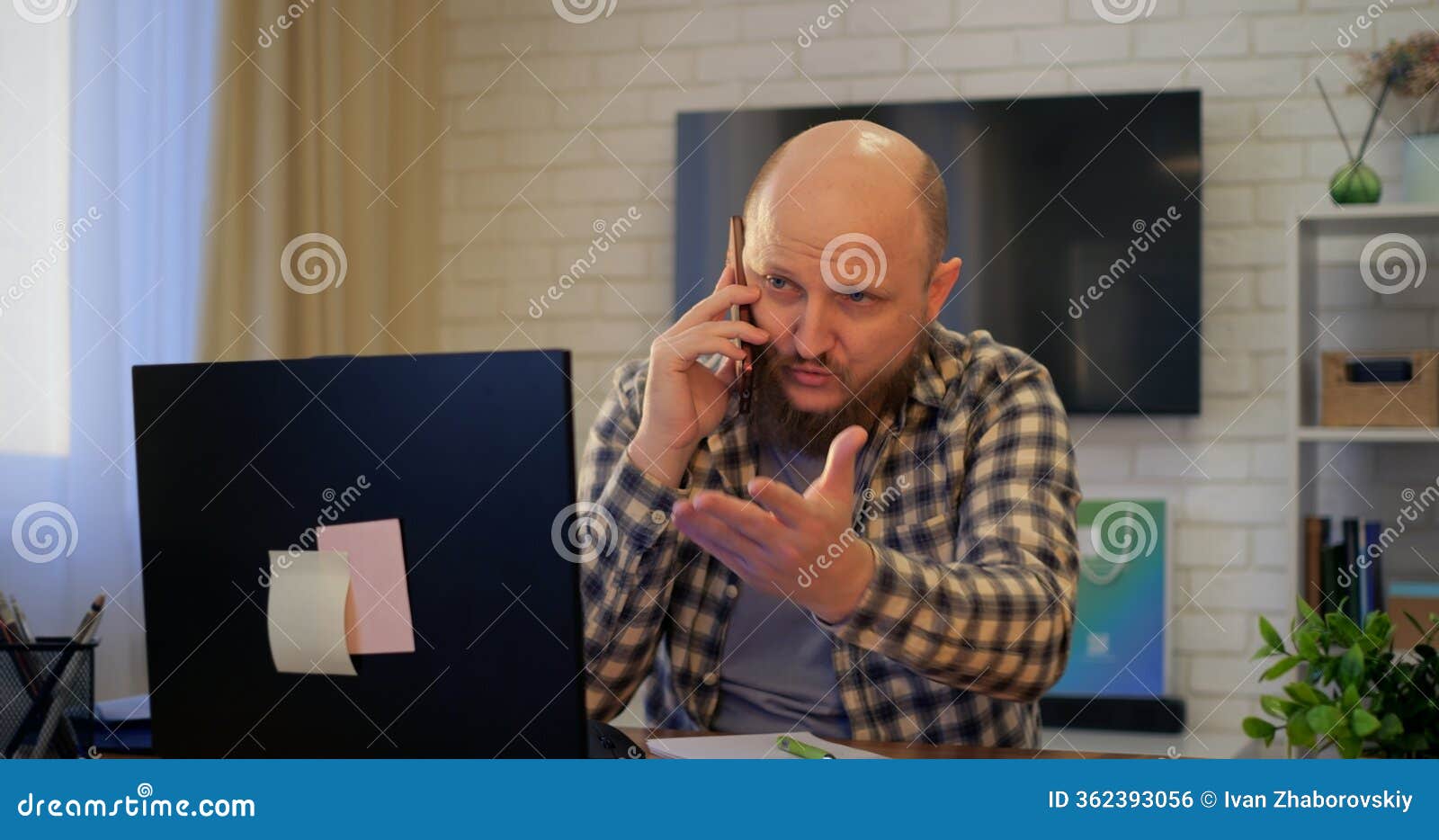 Man Balancing Work Calls and Personal Conversations, Balance Evident in ...