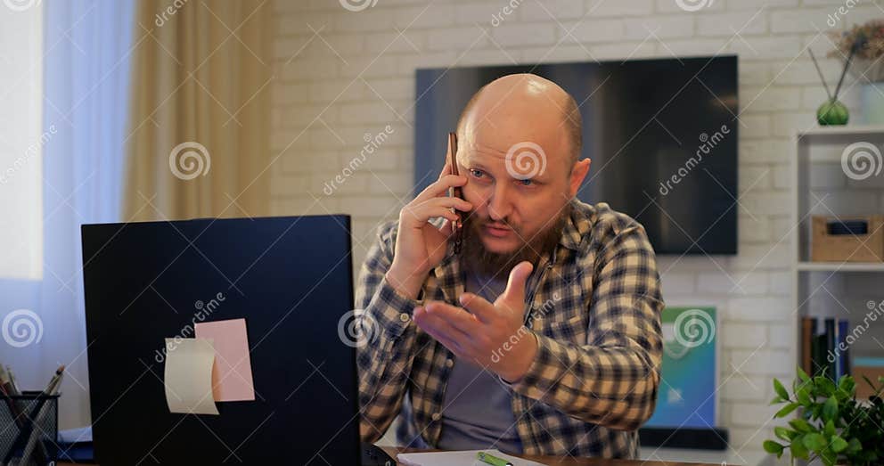 Man Balancing Work Calls and Personal Conversations, Balance Evident in ...