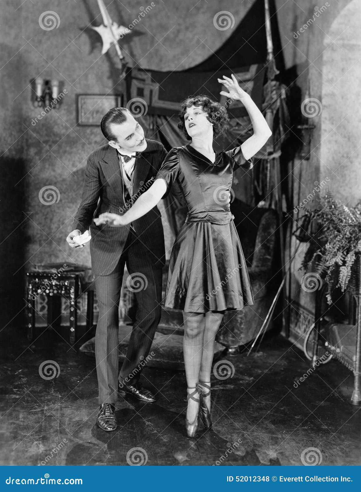 Man with Ballerina En Pointe Stock Photo - Image of balancing, ballet ...