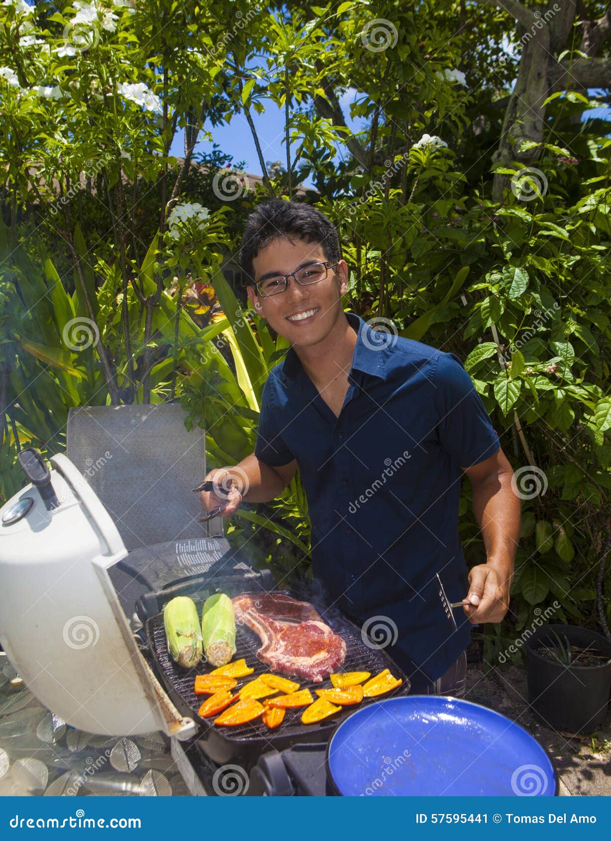 Man Barbecuing in His Garden Stock Image - Image of garden, outdoors ...