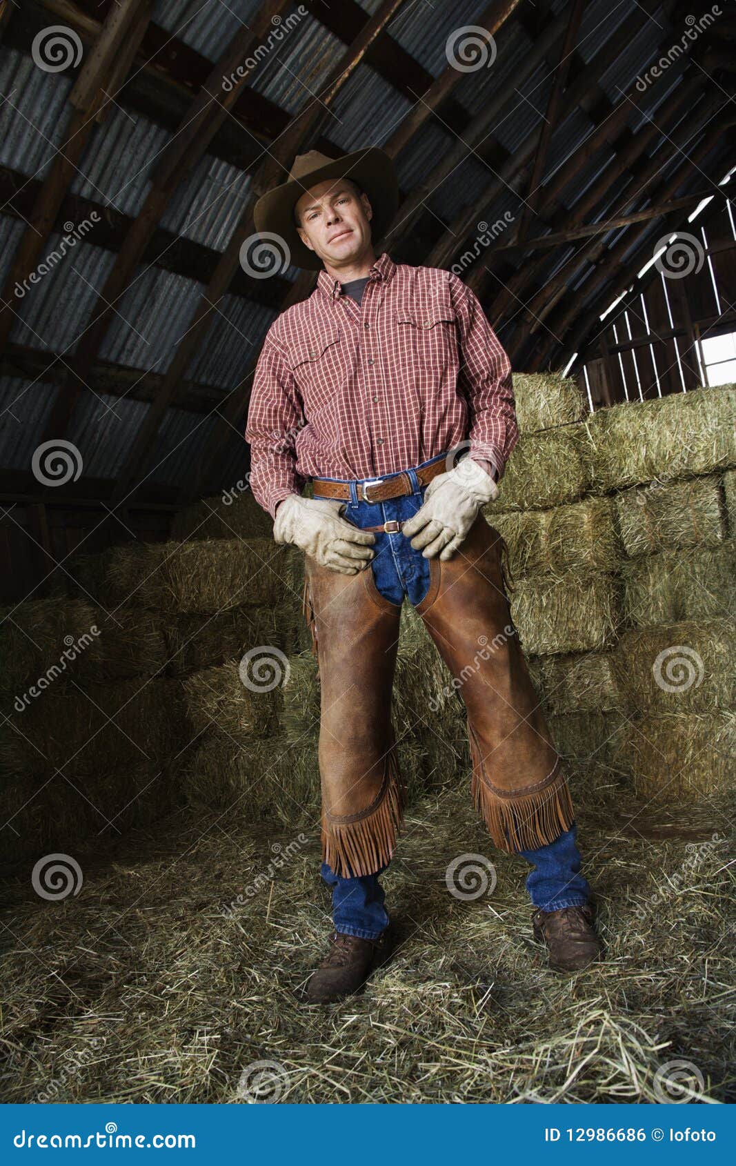 Man In A Barn Wearing A Cowboy Hat Royalty-Free Stock Image ...