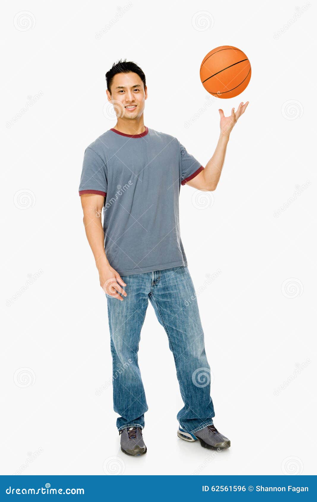 Man with basketball stock photo. Image of front, looking - 62561596