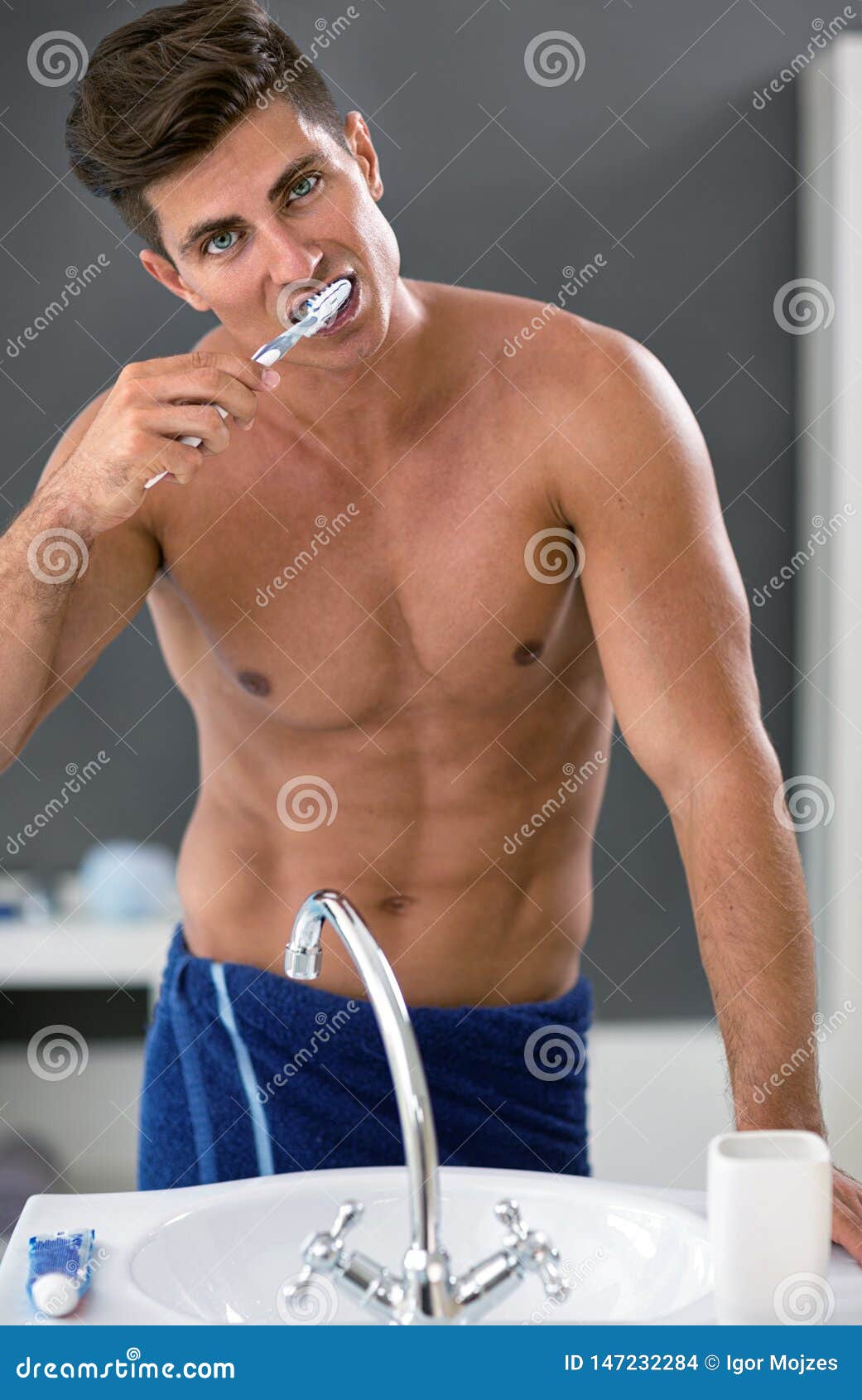 Man in Bathroom Brushing Teeth Stock Photo - Image of dentistry, paste ...
