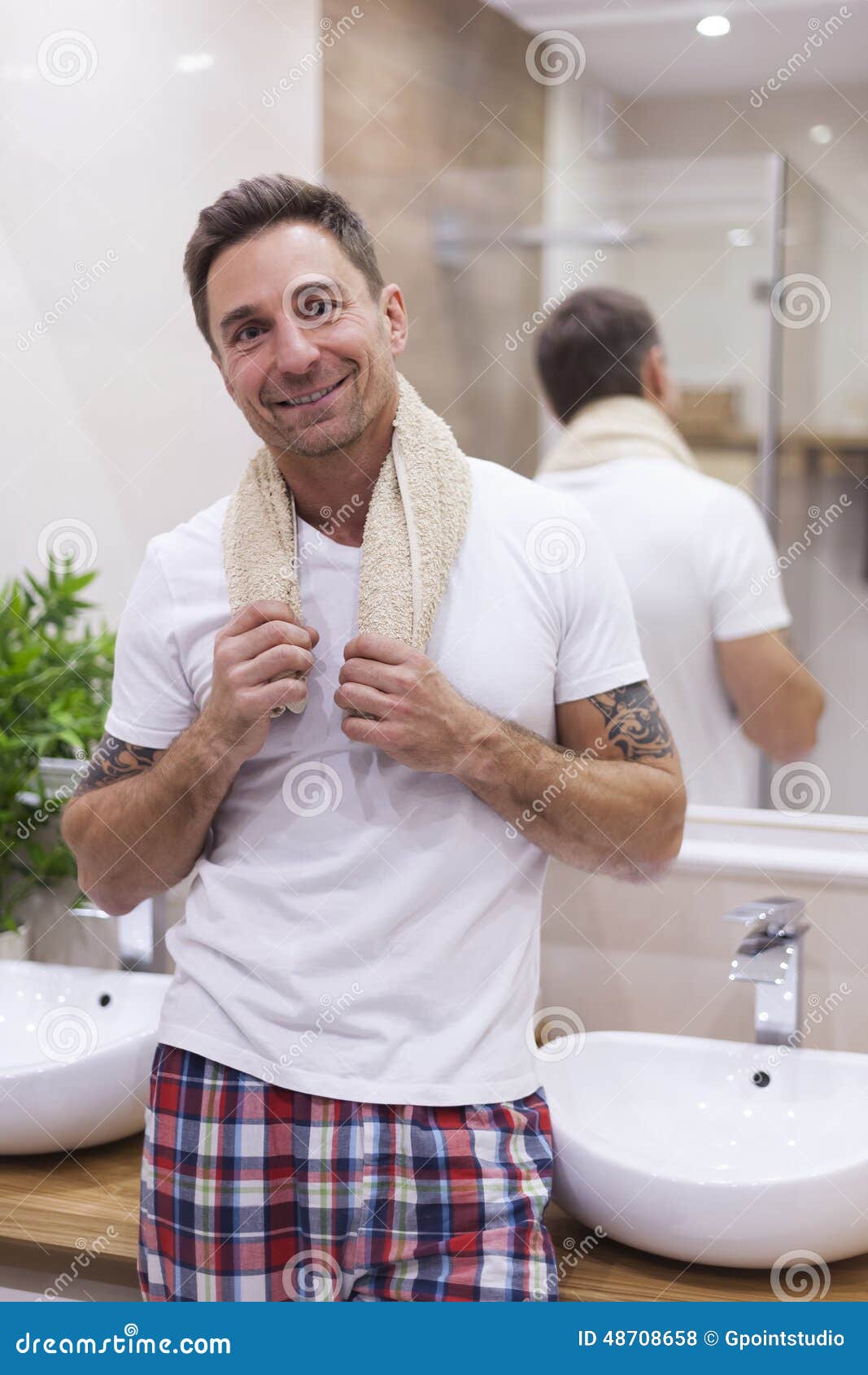 Man in bathroom stock photo. Image of looking, indoors - 48708658