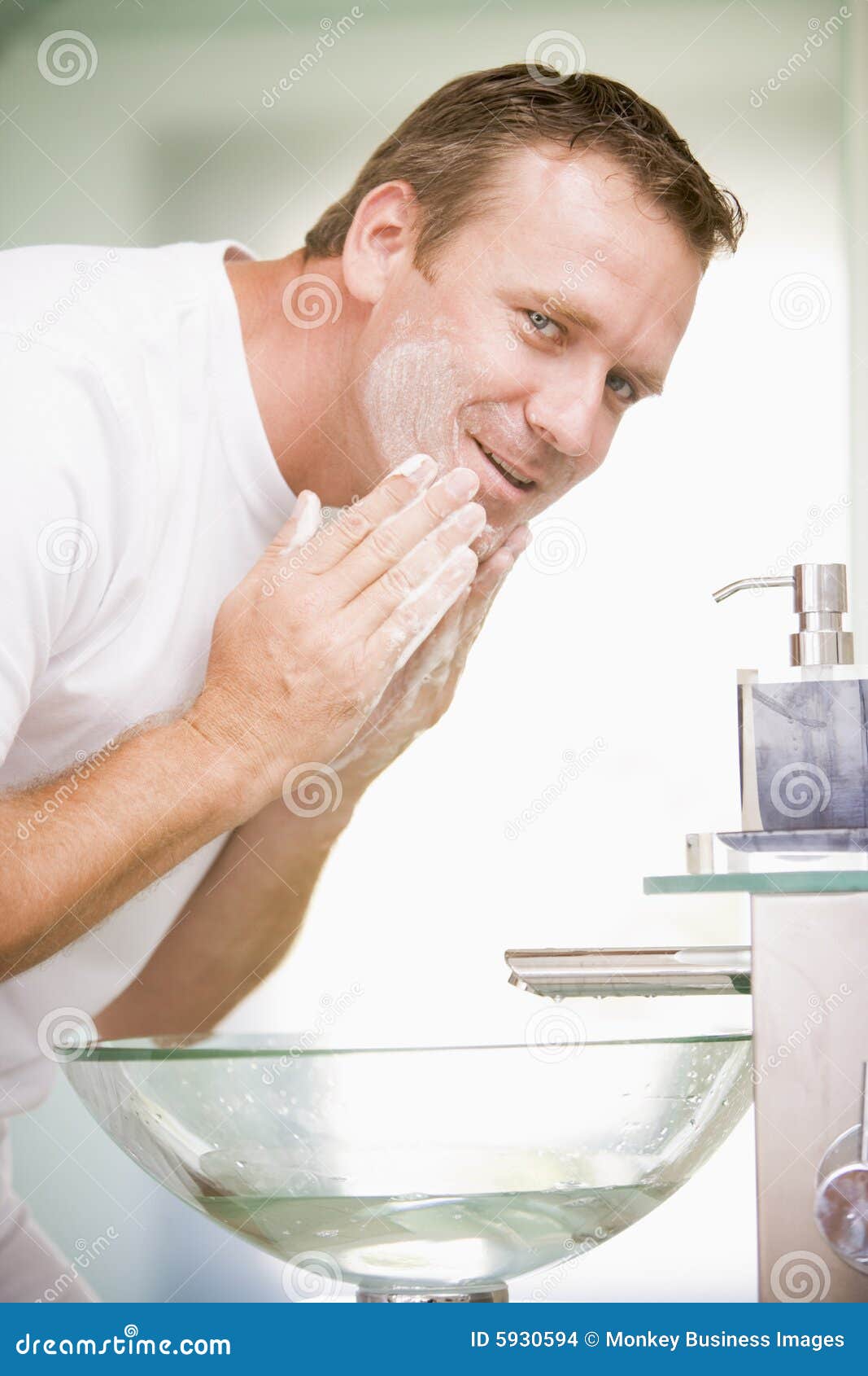 Man in Bathroom Washing Face Stock Photo - Image of happy, person: 5930594