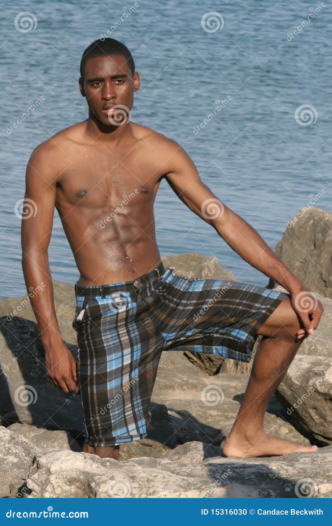 Man at beach stock photo. Image of water, coast, beach - 15316030