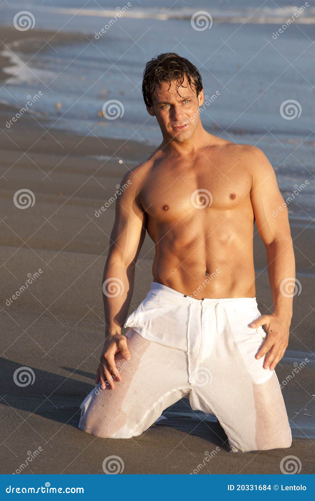 Man on the beach stock photo. Image of sportsman, beach - 20331684