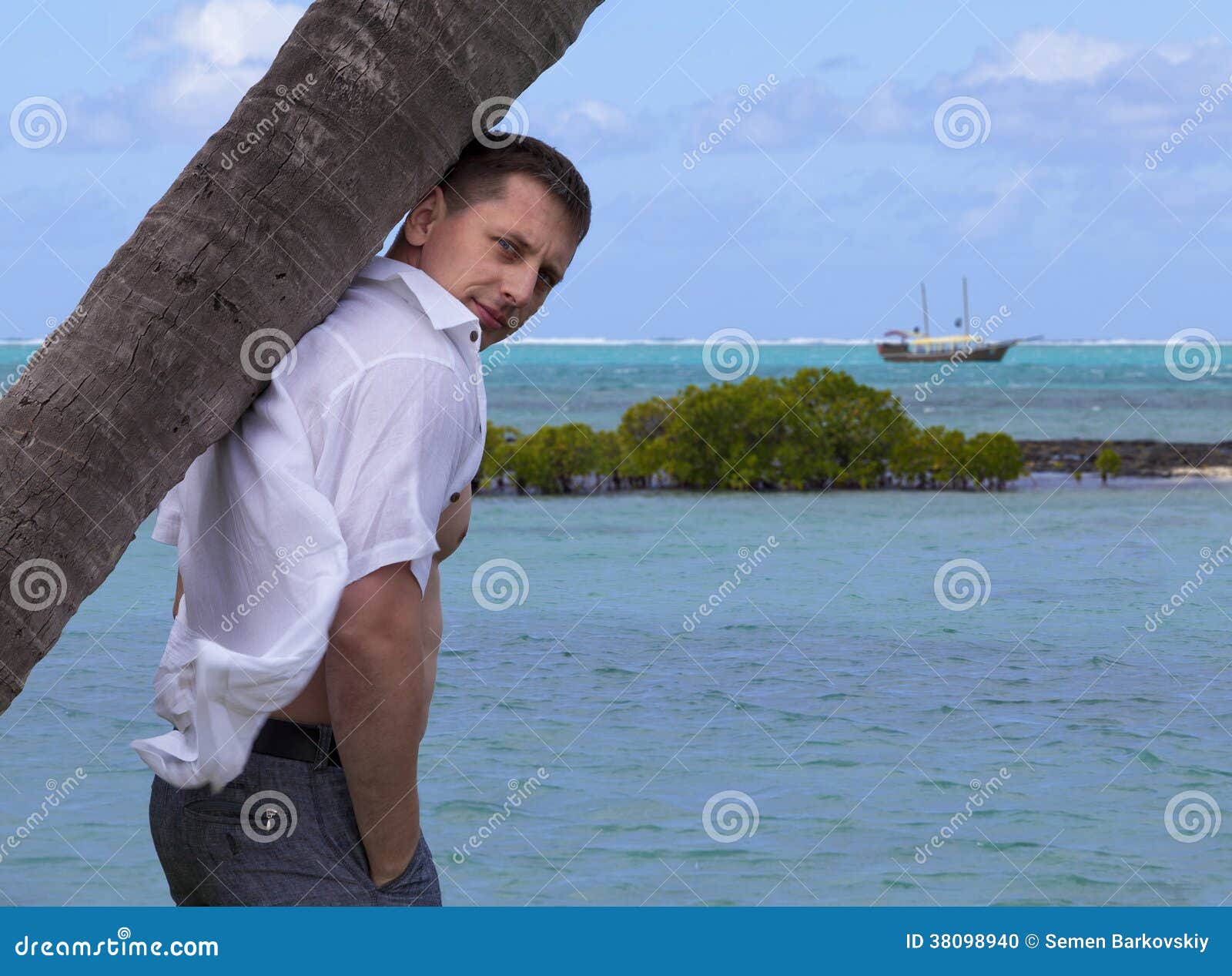 Man on a beach stock photo. Image of rear, shirt, cloud - 38098940