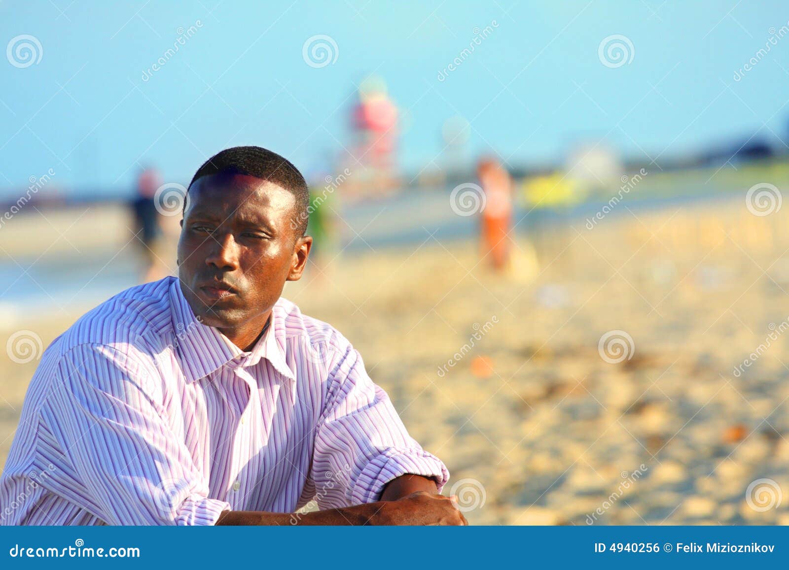 Man on the beach stock photo. Image of side, angle, attractive - 4940256