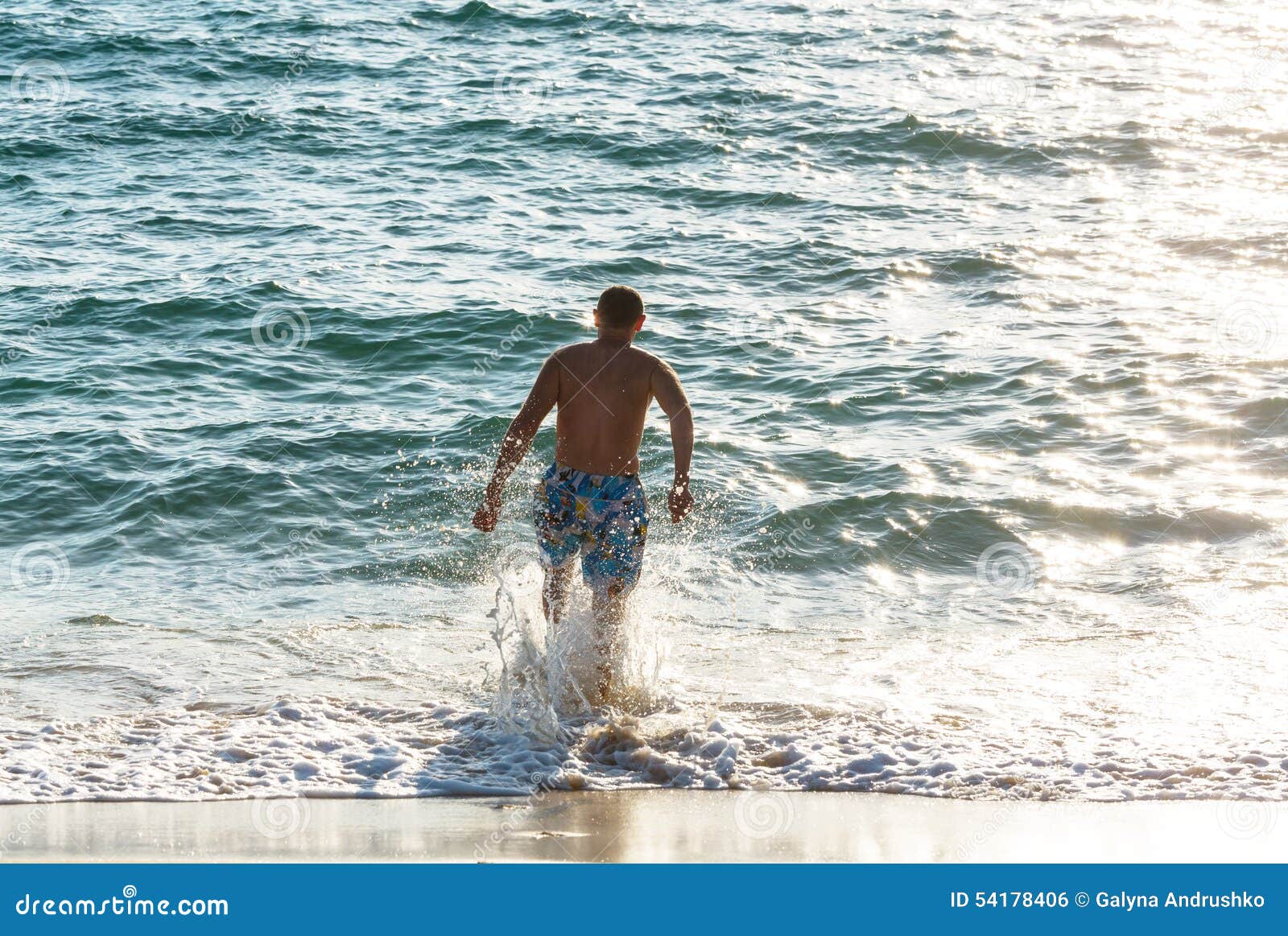 Man on the beach stock photo. Image of summer, water - 54178406
