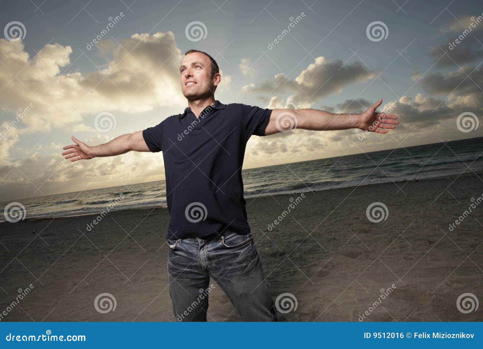Man on the Beach with Arms Extended Stock Photo - Image of outside ...