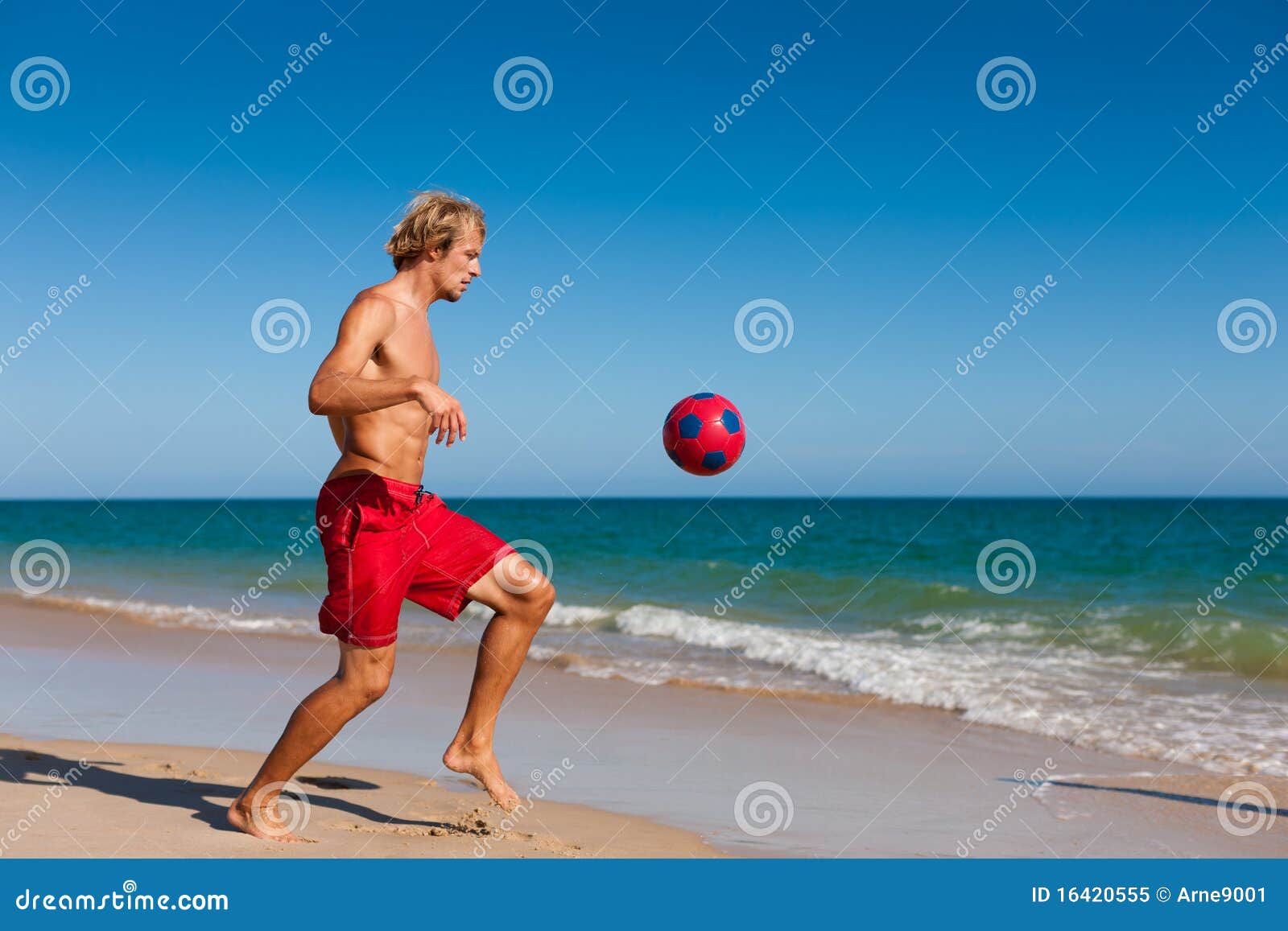 Man On Beach Balancing Soccer Ball Royalty-Free Stock Image ...