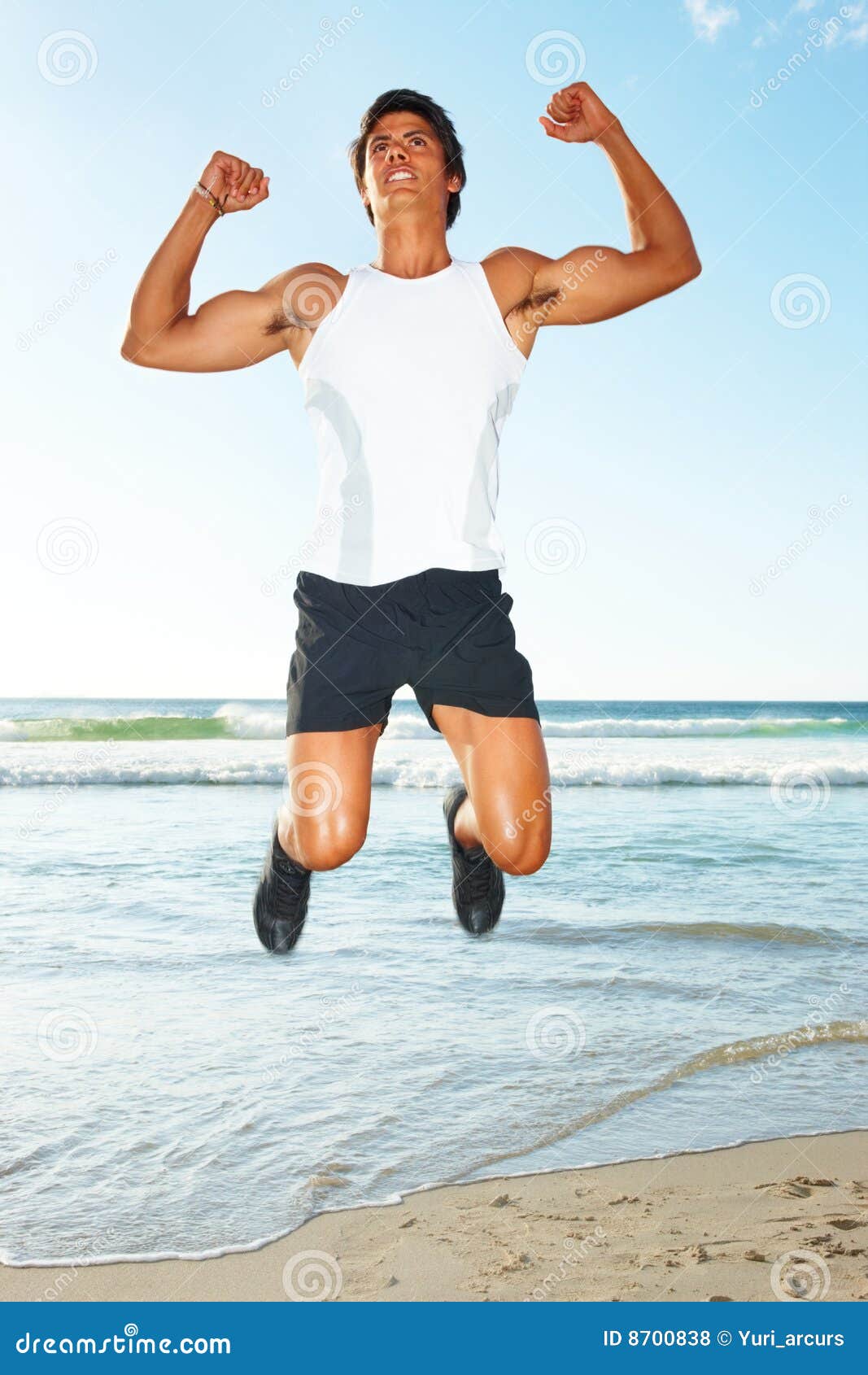Man at the Beach Jumping in the Air Stock Photo - Image of isolated ...
