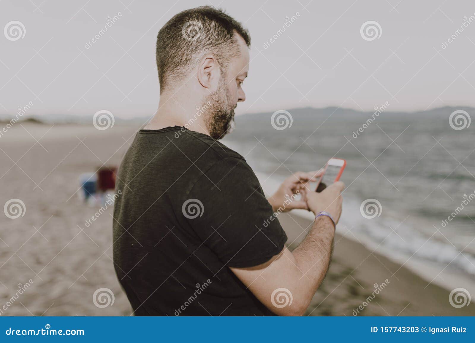 Man on the Beach Making a Call Stock Image - Image of peaceful ...