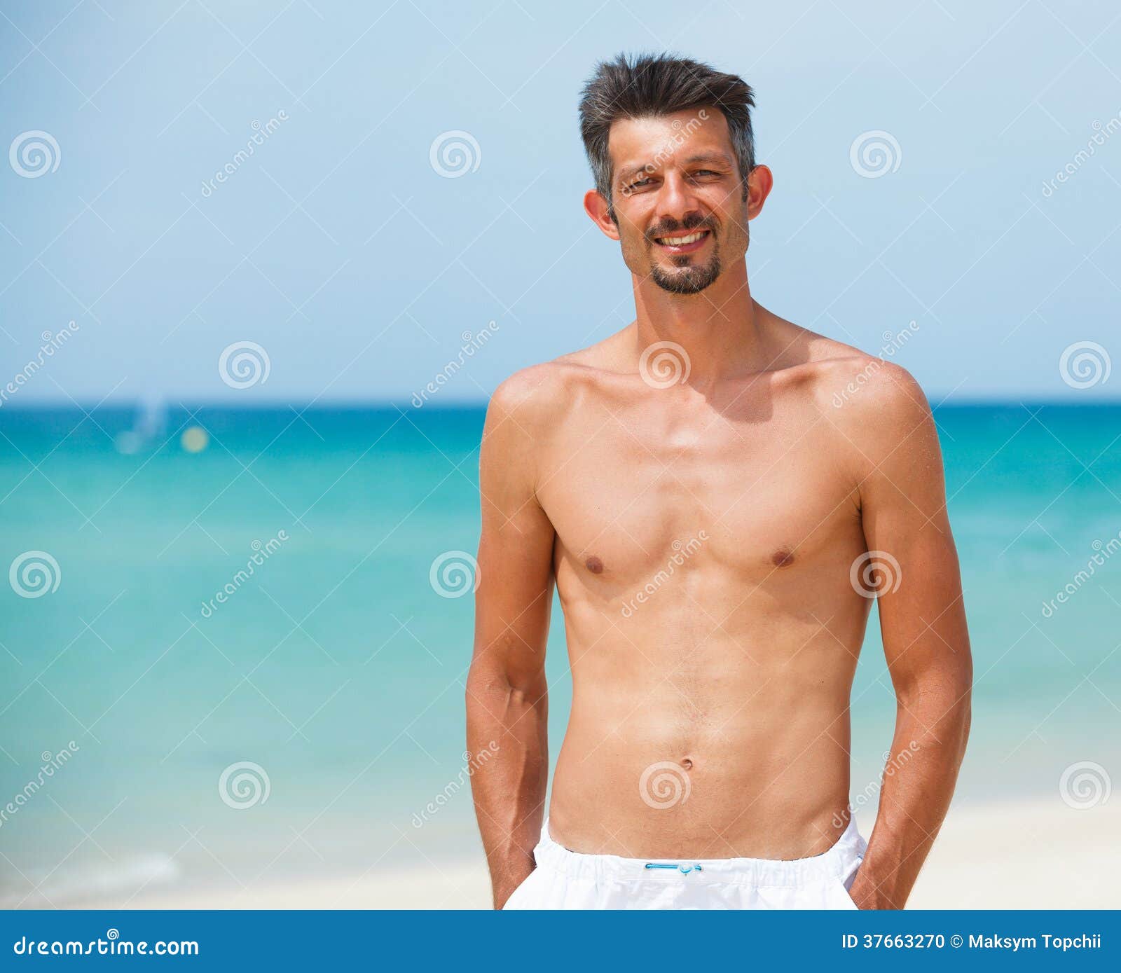 Man on the beach stock photo. Image of horizon, elegant - 37663270