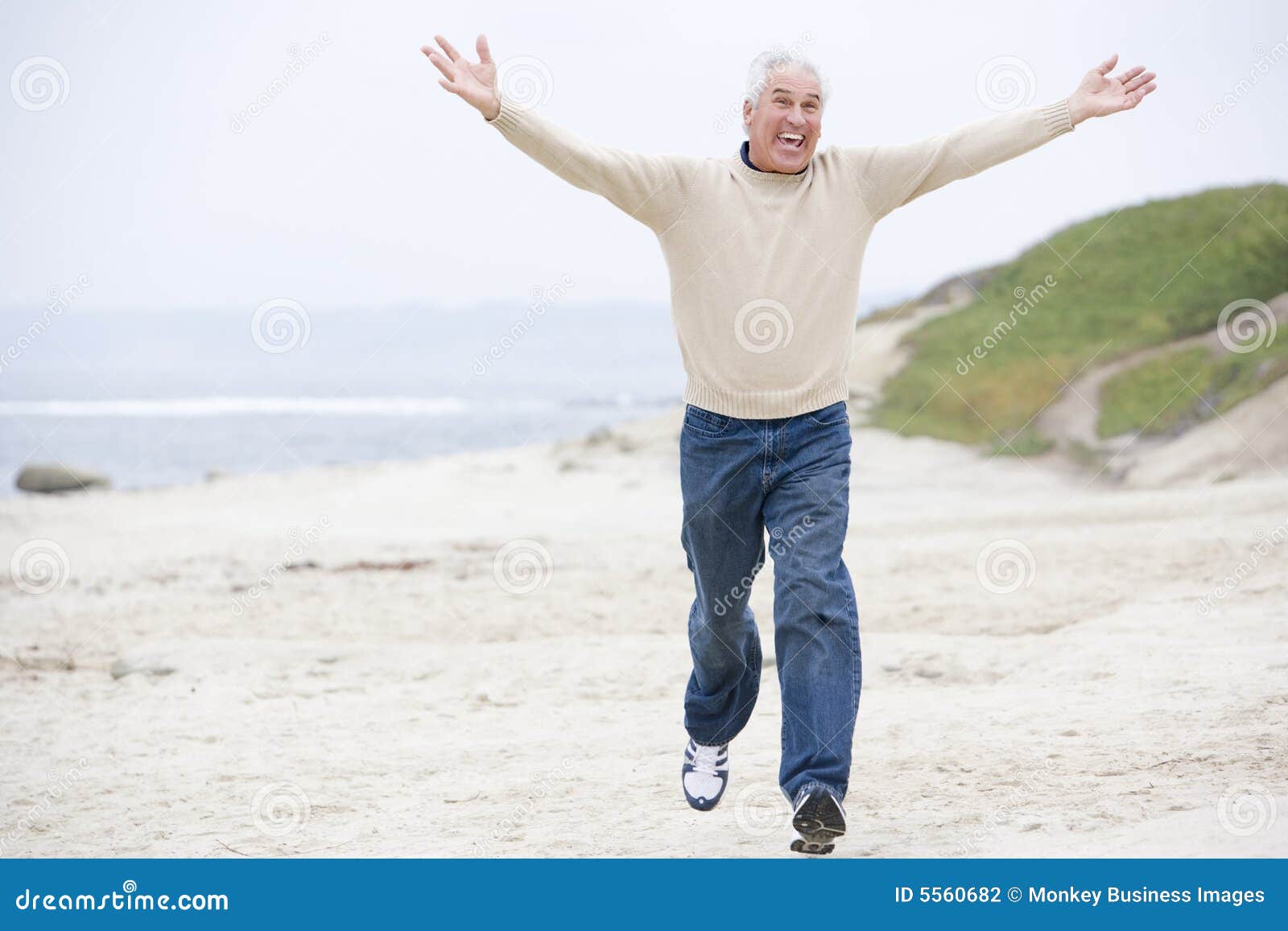 Man at the Beach Running and Smiling Stock Photo - Image of jogging ...