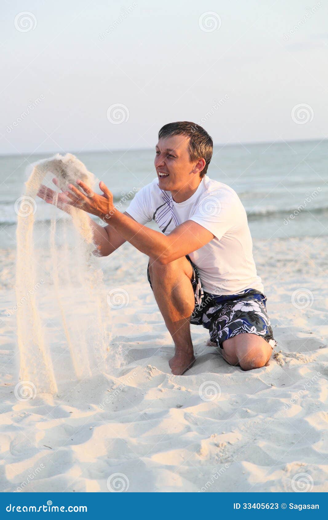Man on the beach stock image. Image of human, hands, male - 33405623