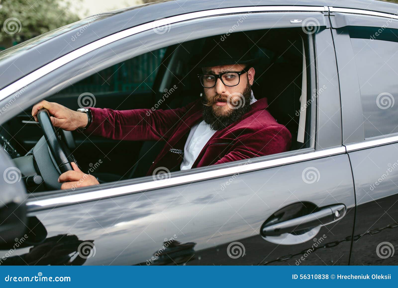 Man with Beard Driving a Car Stock Photo - Image of clothing, fashion ...