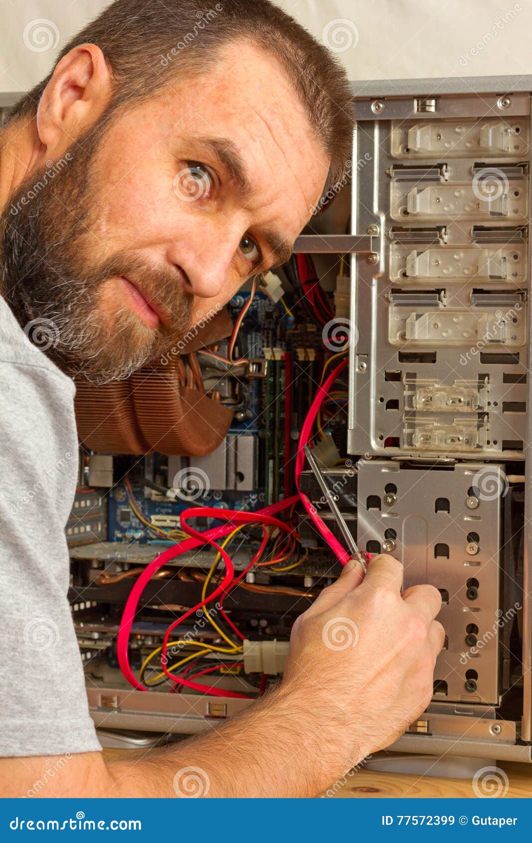 A Man with a Beard Fixing the System Unit Stock Image - Image of beard ...