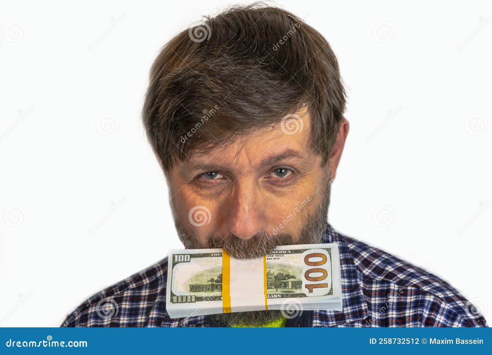 A Man with a Beard Holds a Pack of Hundred-dollar Bills in His Teeth ...