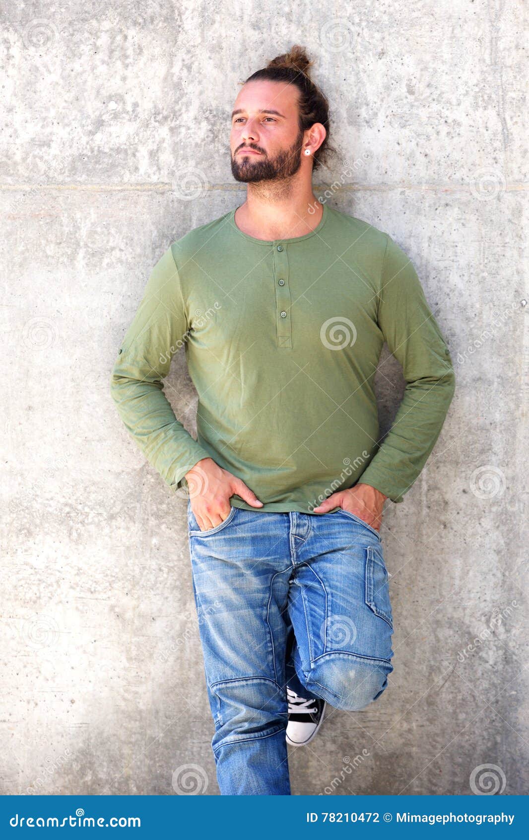 Man with Beard Leaning Against Wall Stock Photo - Image of face ...