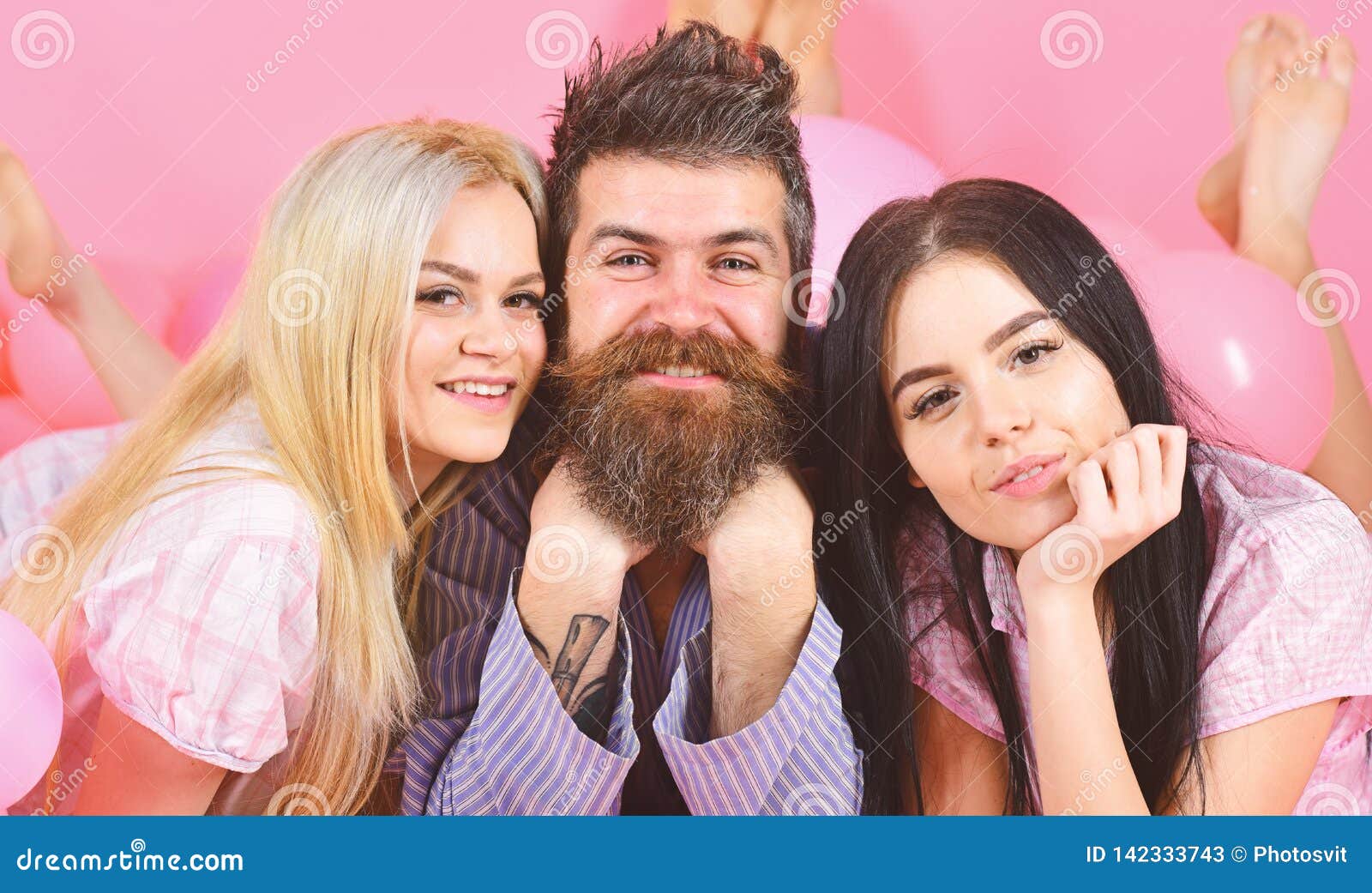 Man With Beard And Mustache Attracts Blonde And Brunette Girls Girls