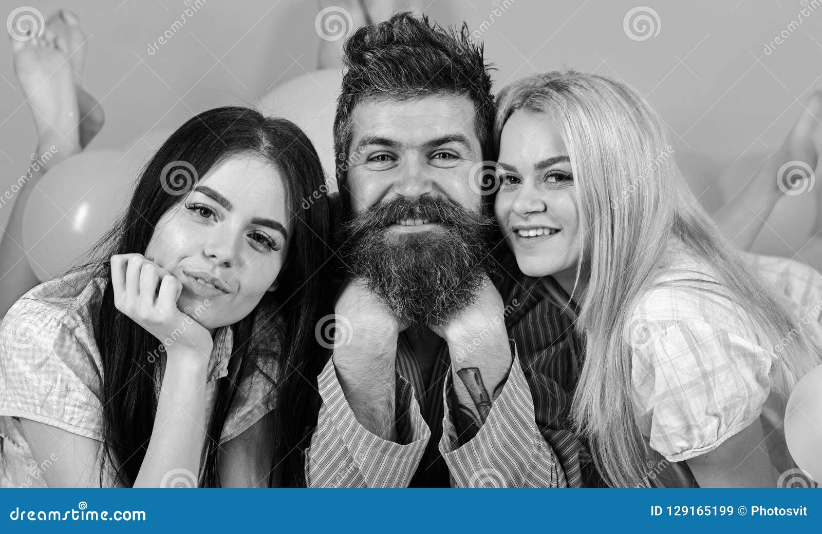 Man With Beard And Mustache Attracts Blonde And Brunette Girls Girls