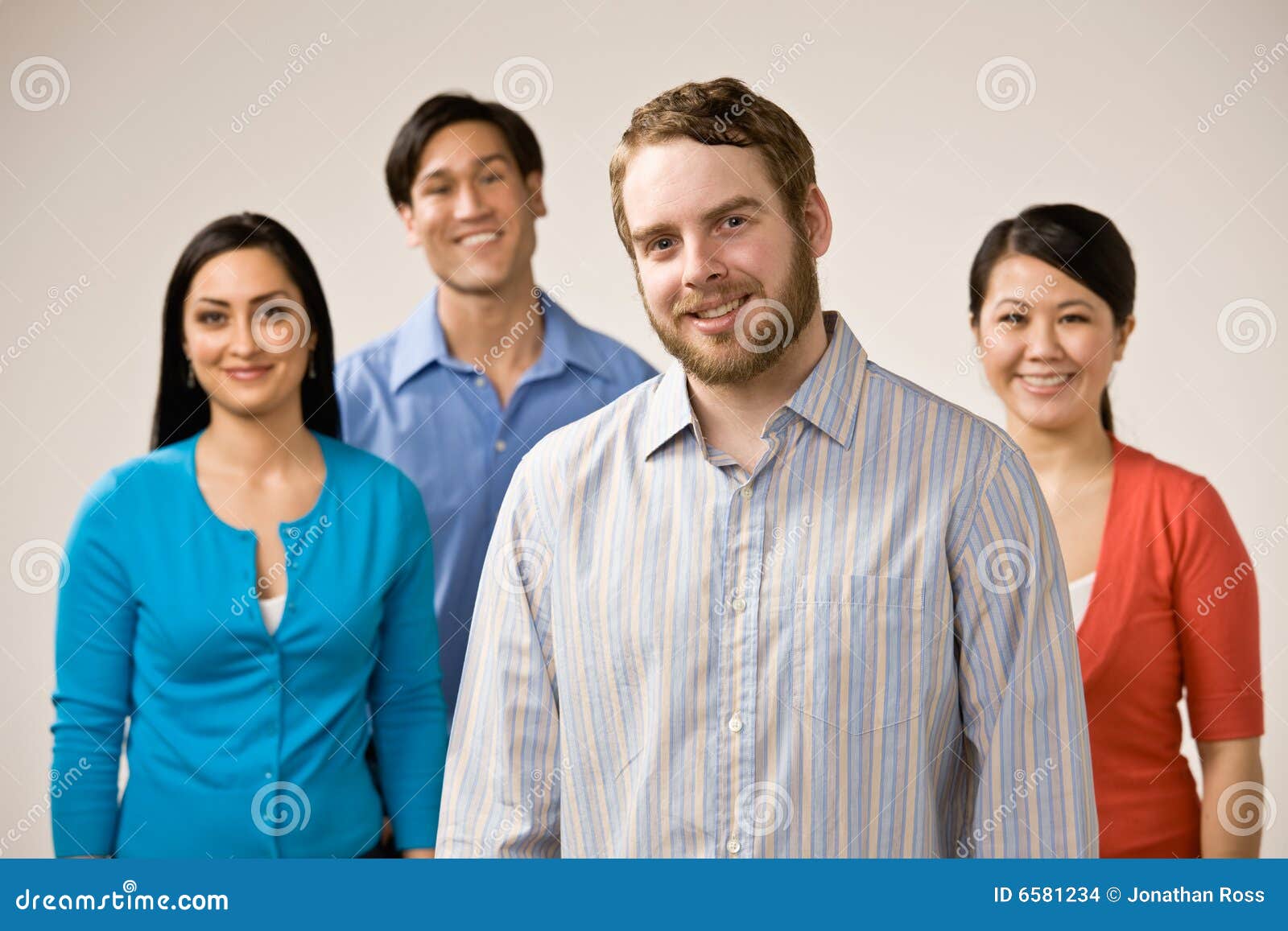 Man with Beard Posing with Friends Stock Photo - Image of race, woman ...