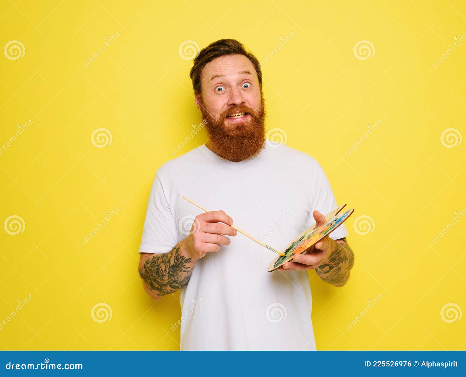 Doubter Man with Beard and Tattoo is Ready To Draw with Brushes Stock ...