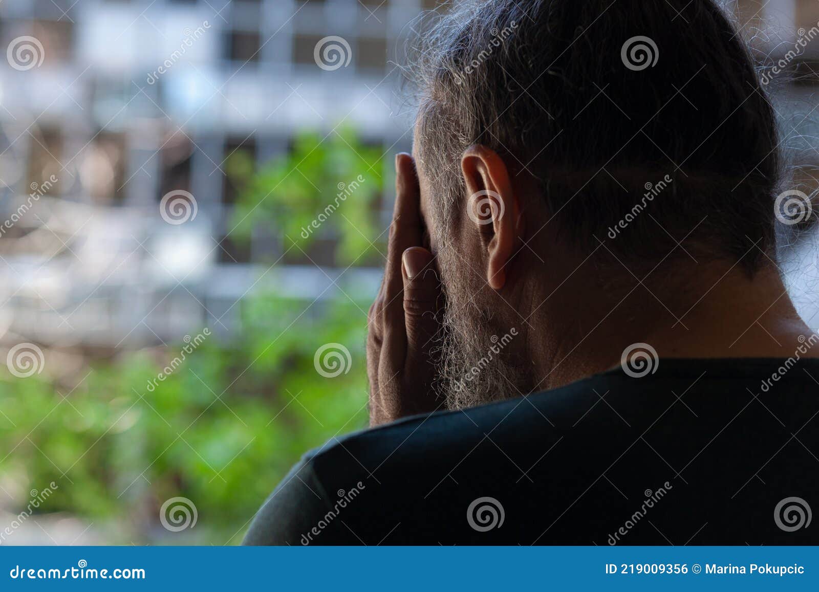 Man with Beard Standing in Front Abandoned Destroyed Building, Covering ...