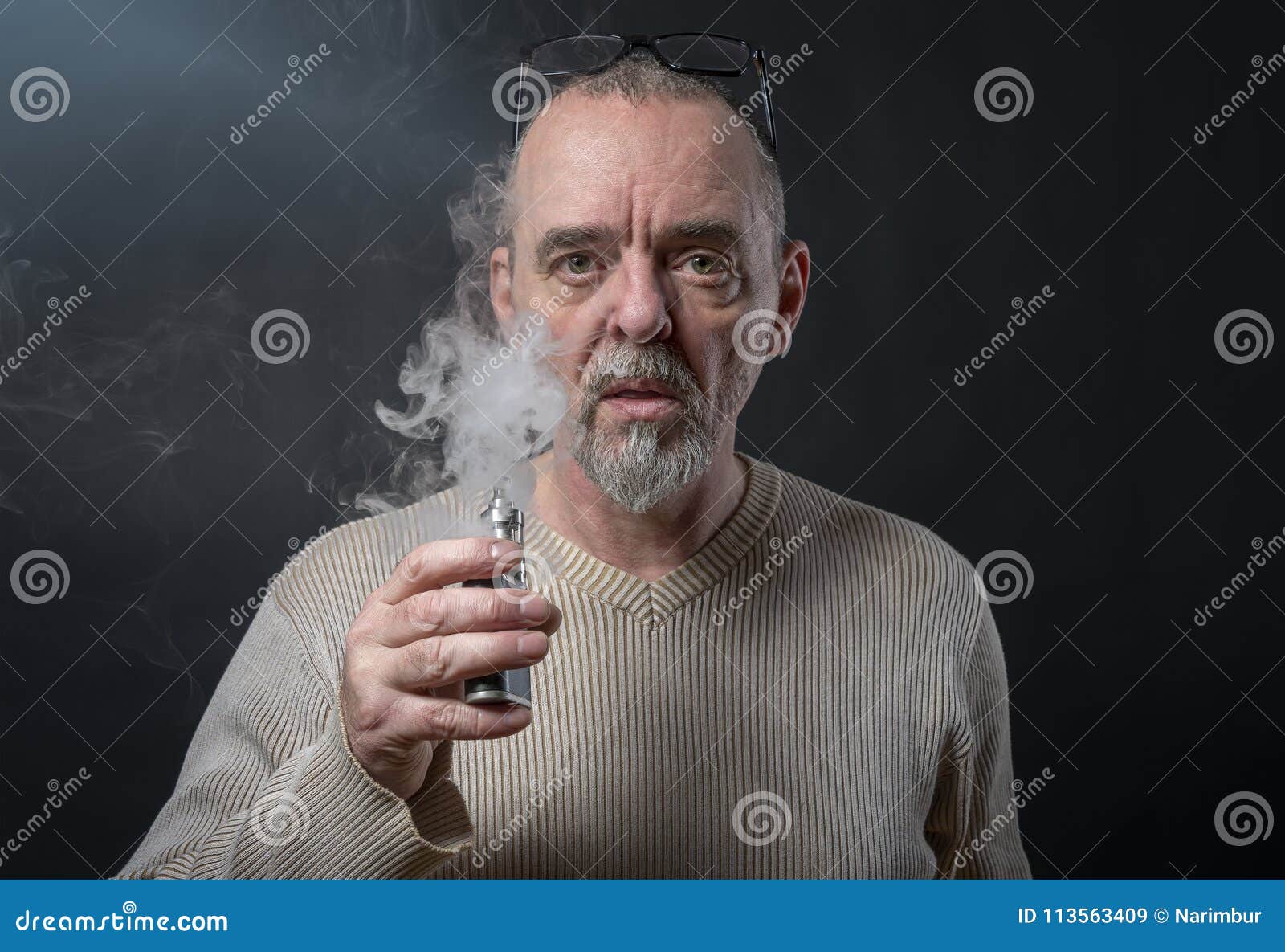 Man with Beard Who is Vaping Stock Image - Image of pullover, healthy ...