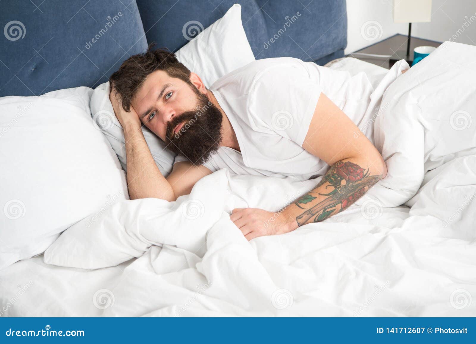 Man Bearded Hipster Having Problems with Sleep. Guy Lying in Bed Try To ...