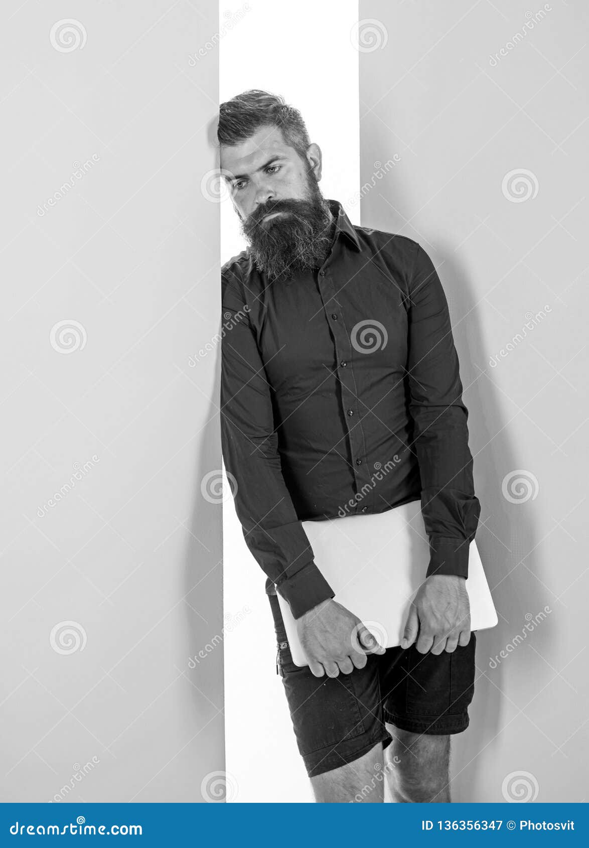 Man Bearded Hipster Worker with Laptop Lean on Wall. Guy Web Developer ...