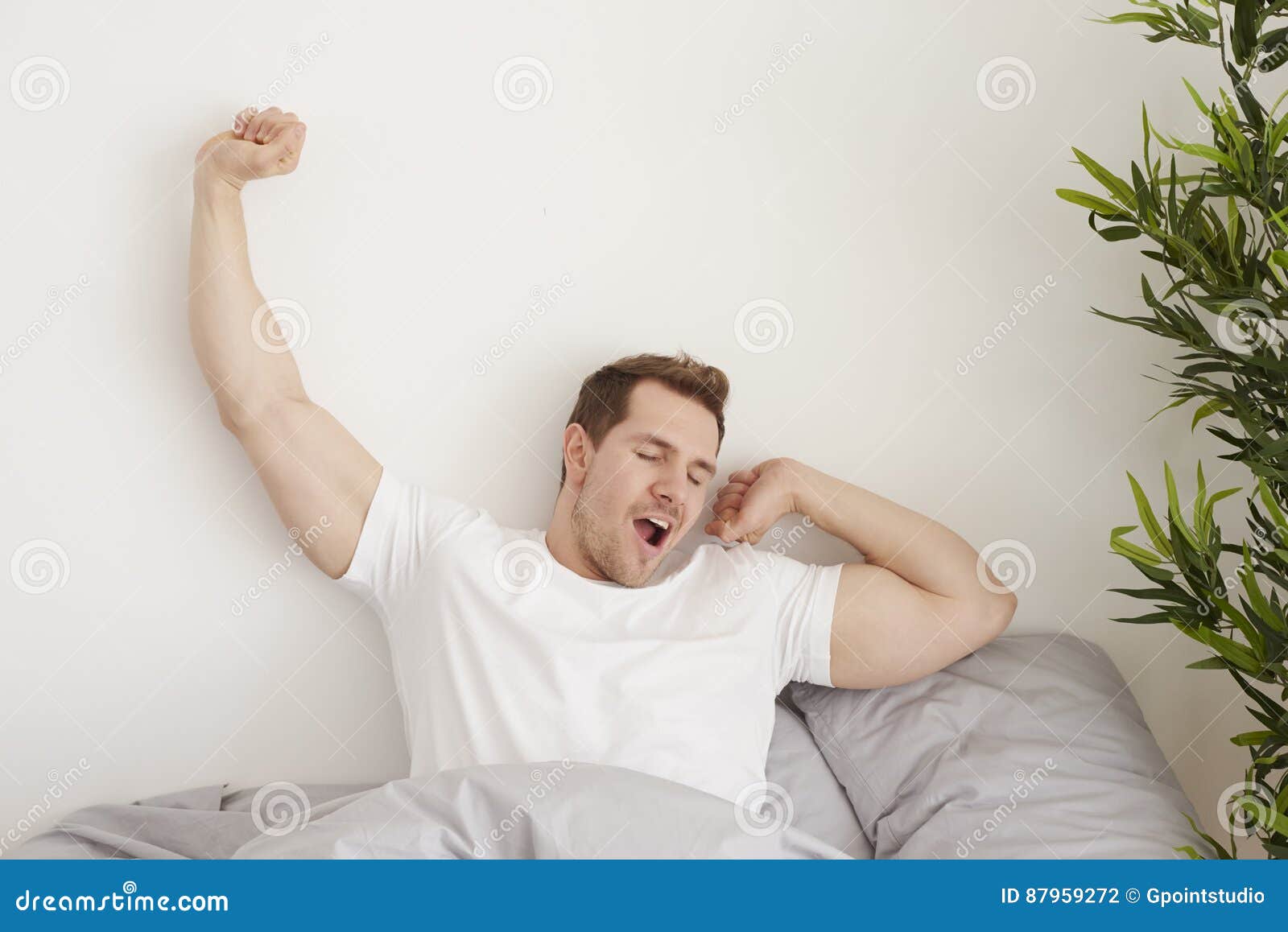 Man at the bed stock photo. Image of handsome, person - 87959272