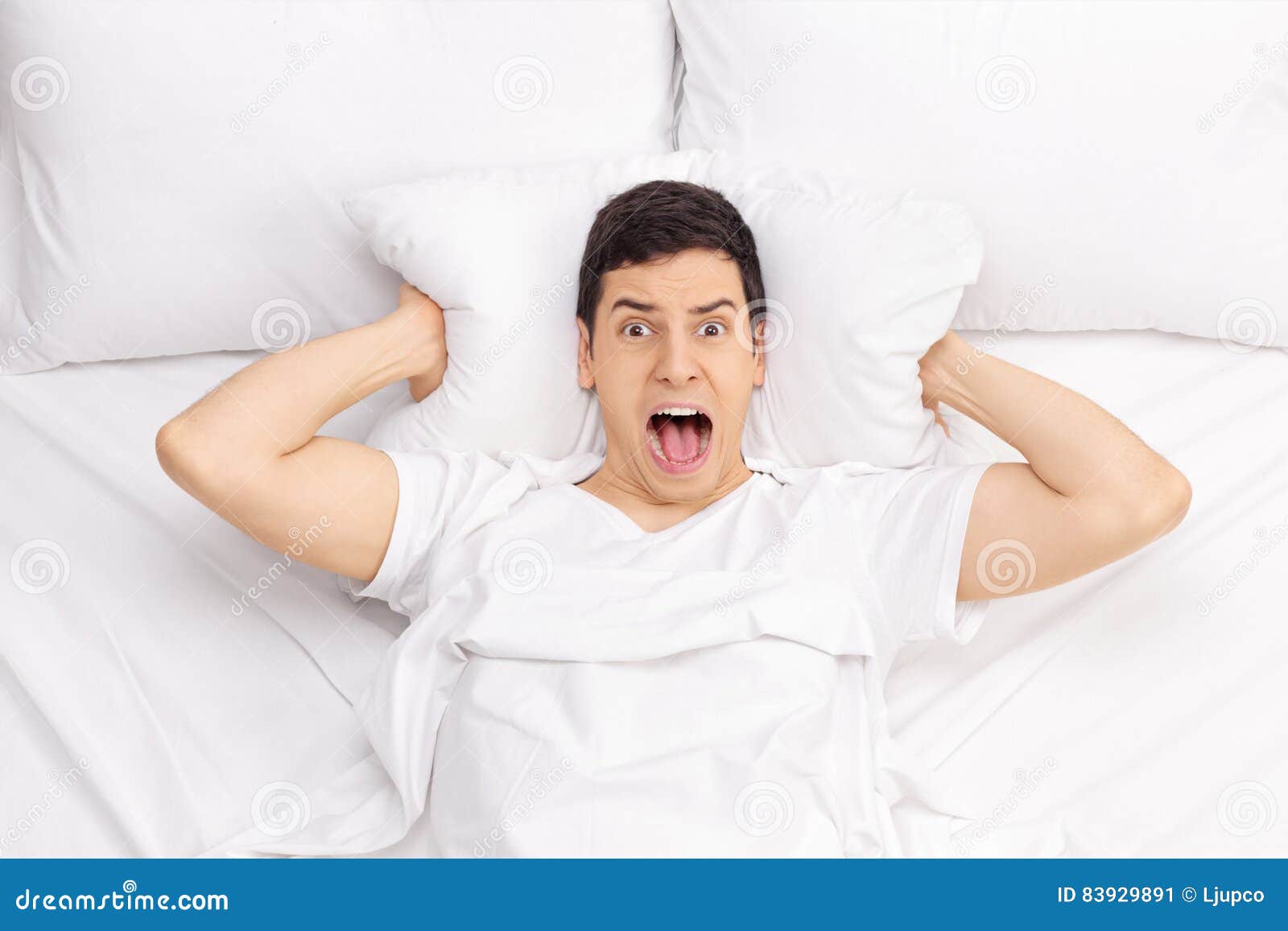 Man in bed screaming stock image. Image of frustration - 83929891