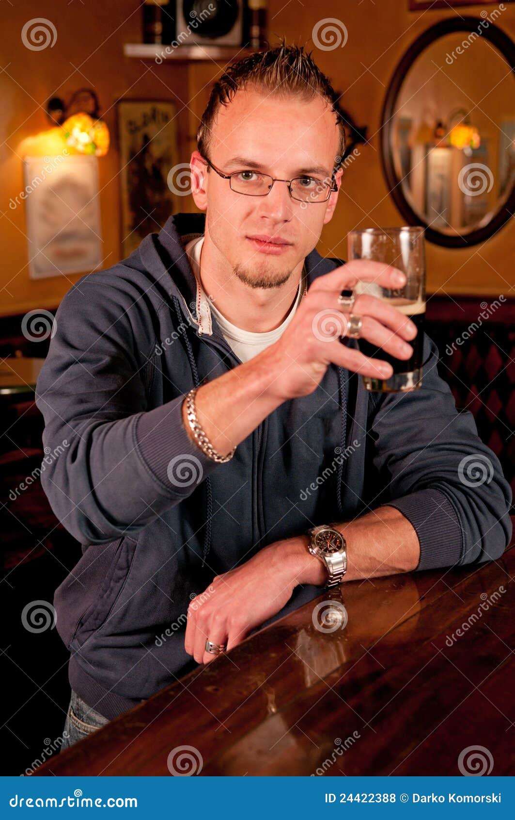 Man with a Beer Giving a Toast Stock Photo - Image of toast, drink ...