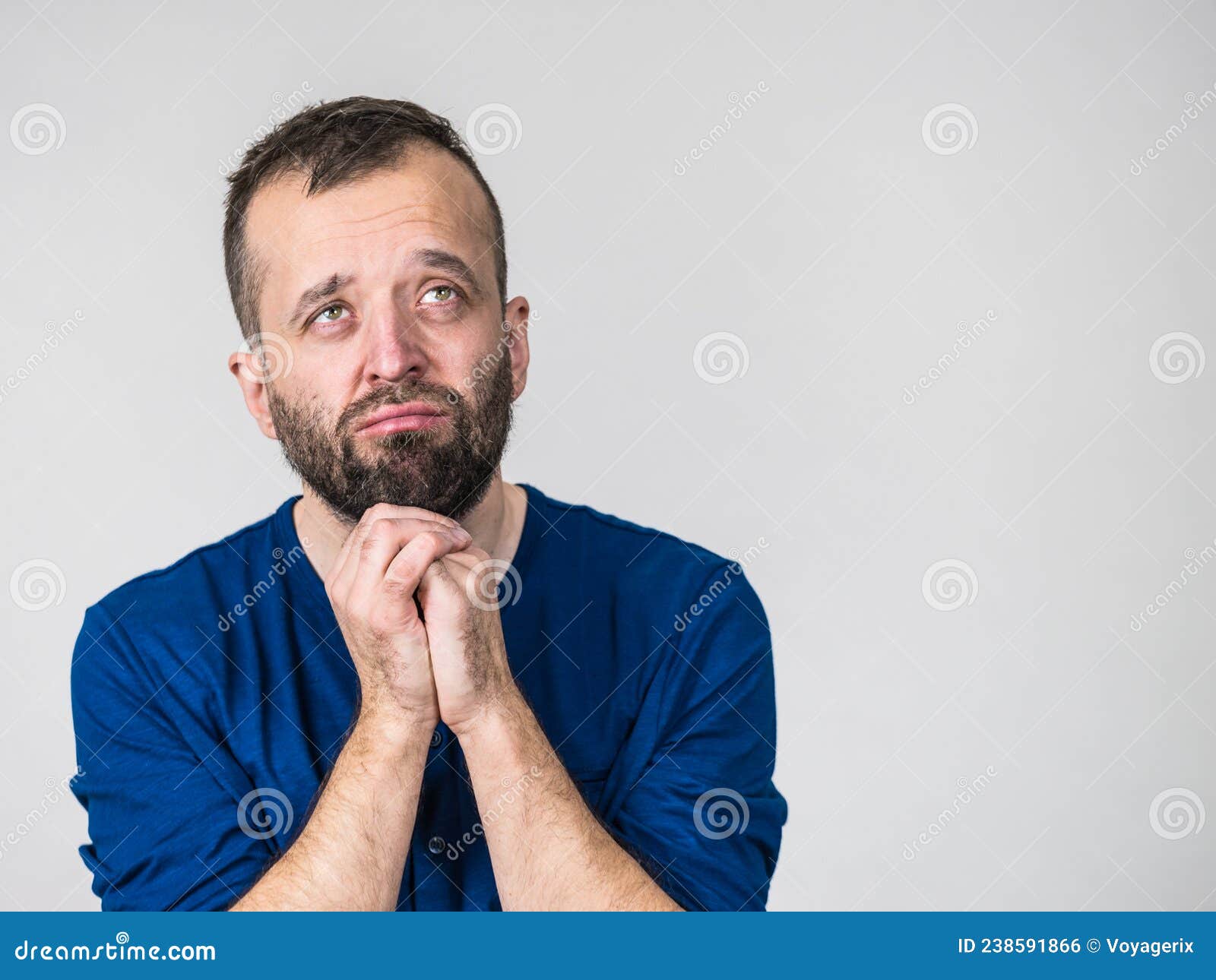 Man begging or apologizing stock photo. Image of pleading - 238591866