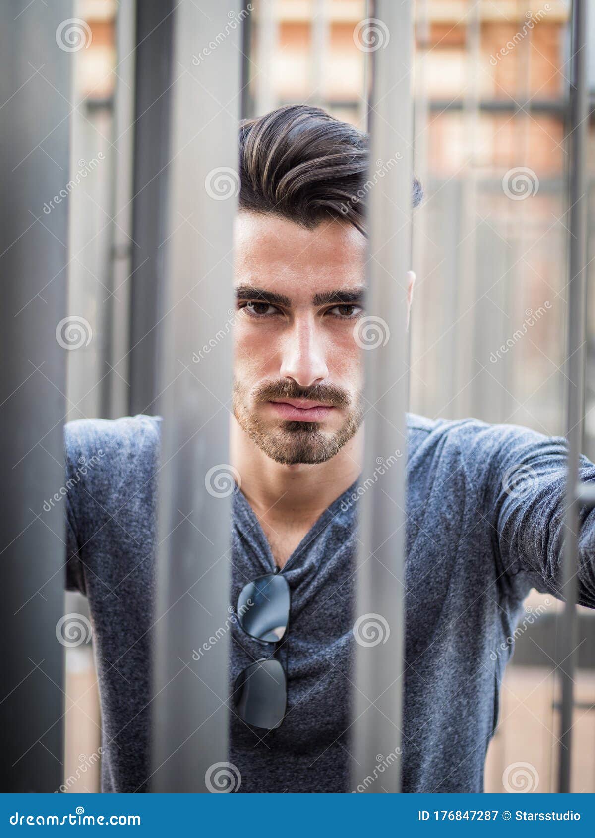 Man behind bars stock image. Image of portrait, confidence - 176847287