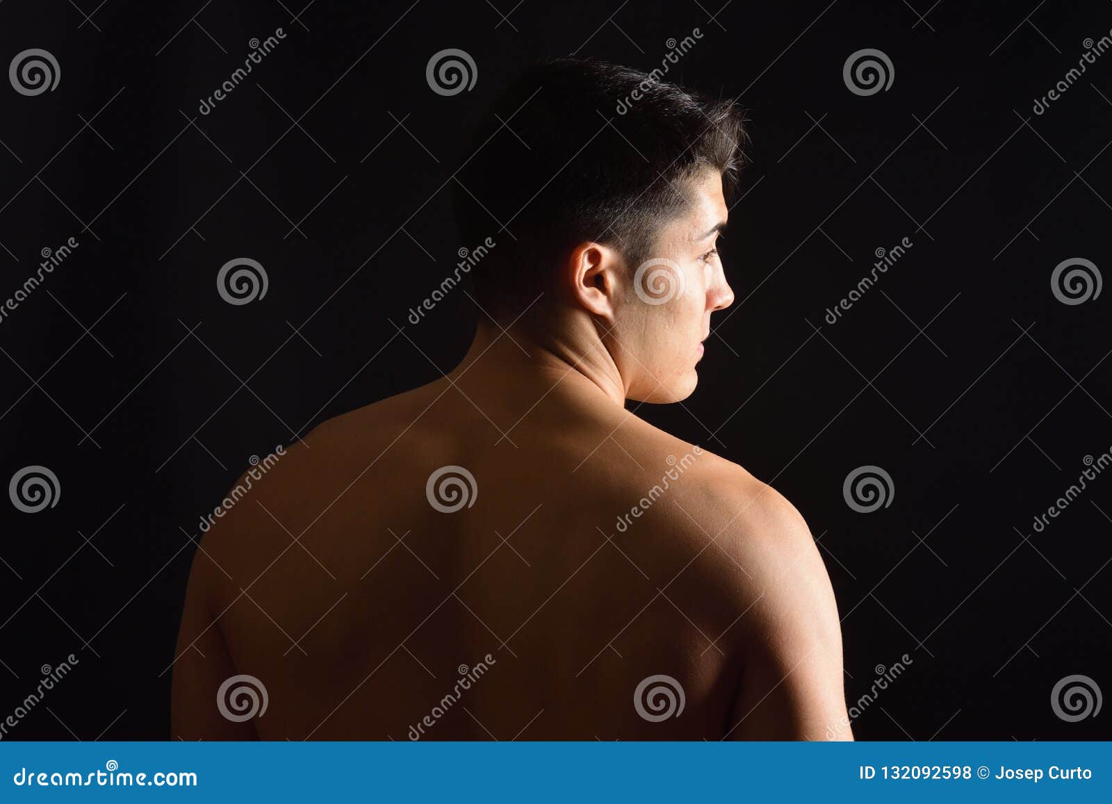 A man from behind in black stock photo. Image of fitness - 132092598