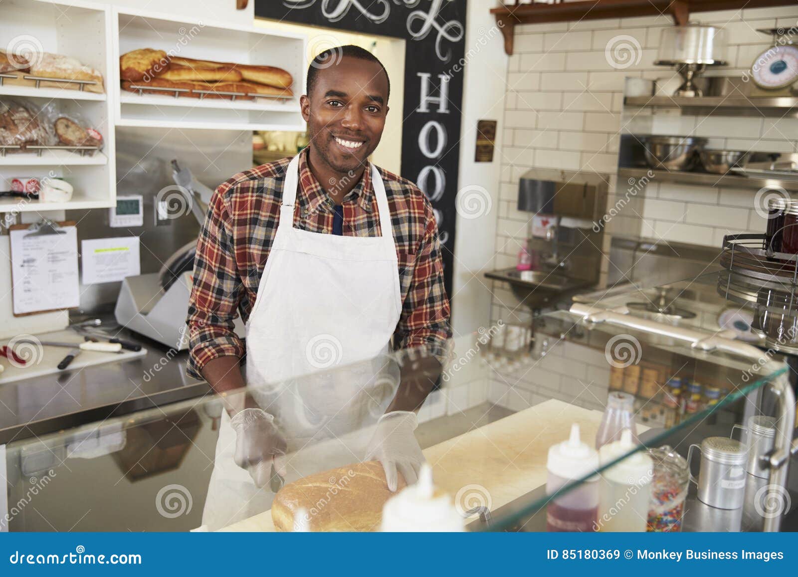 Man Behind the Counter at a Sandwich Bar Looking To Camera Stock Image ...
