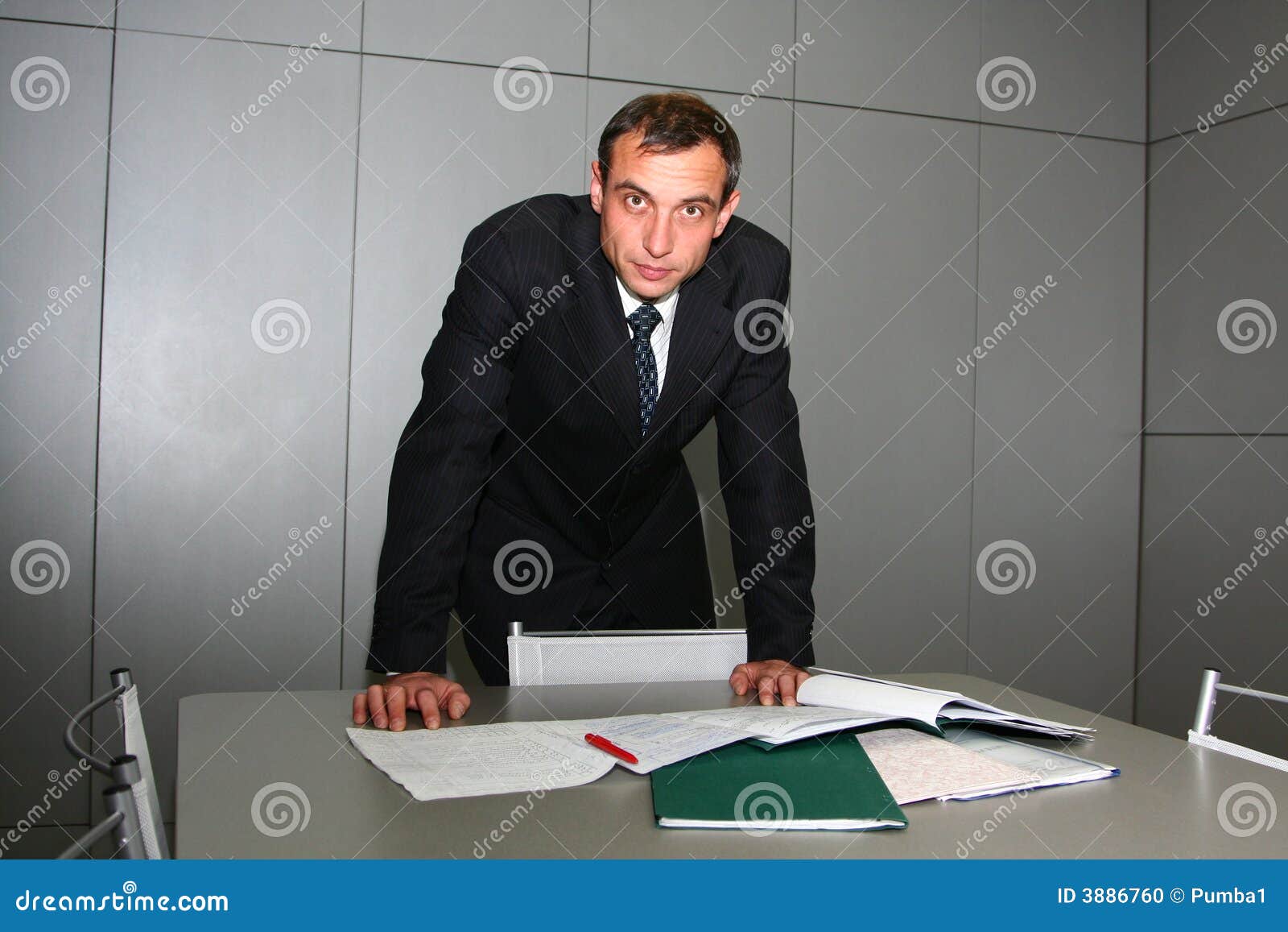 The Man Behind a Table with Documents Stock Photo - Image of head ...