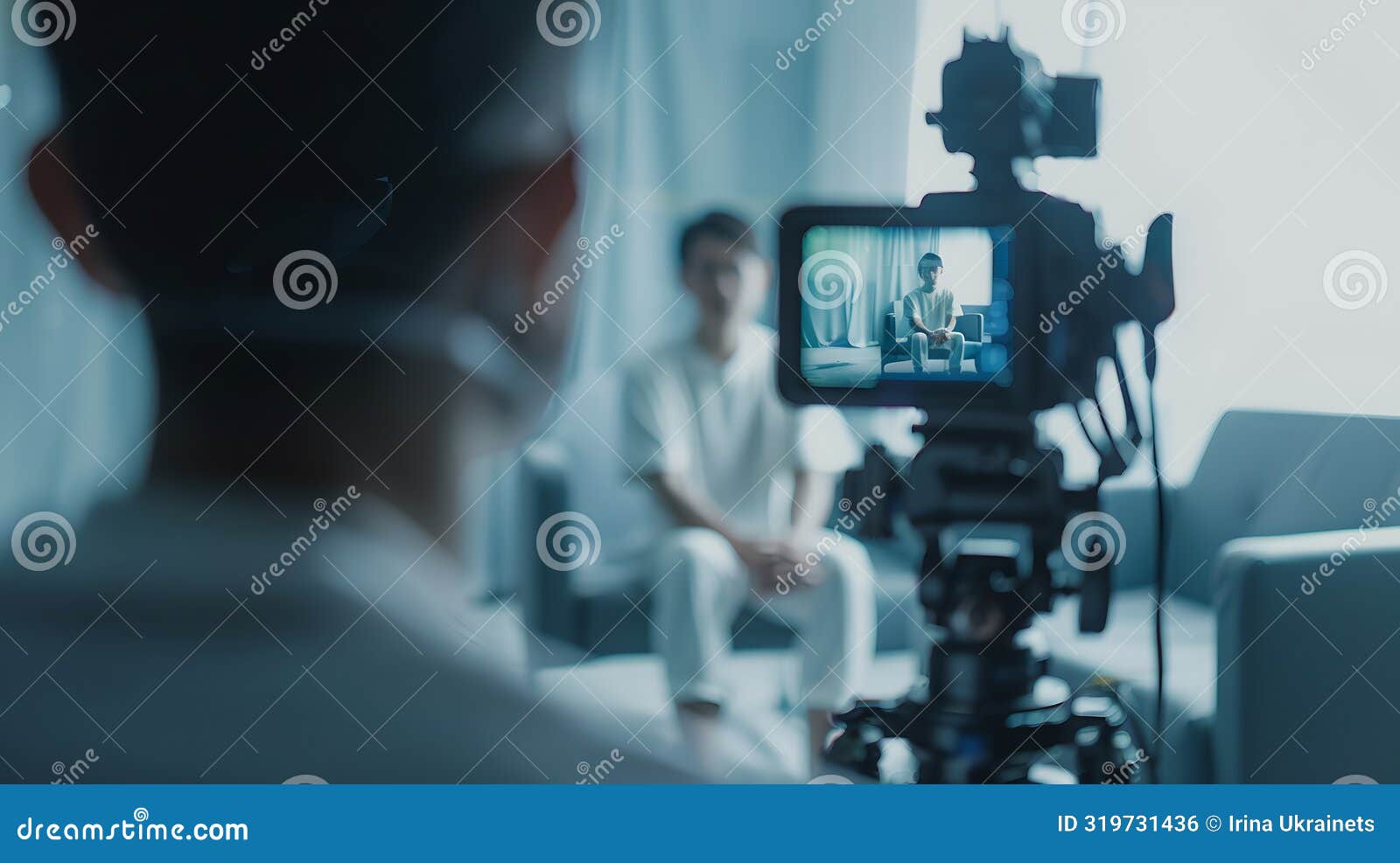Man Being Filmed for an Interview in a Modern Setting. Professional ...