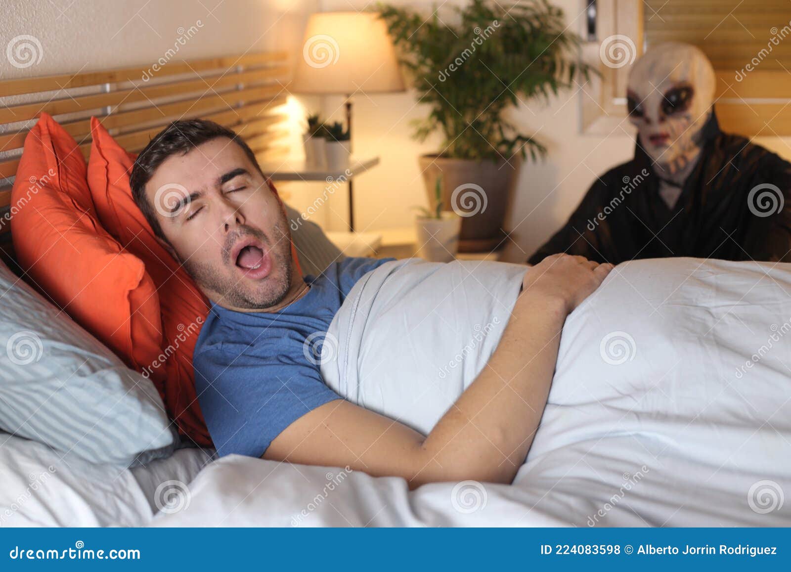 Man Being Observed by Alien while Sleeping Stock Photo - Image of ...