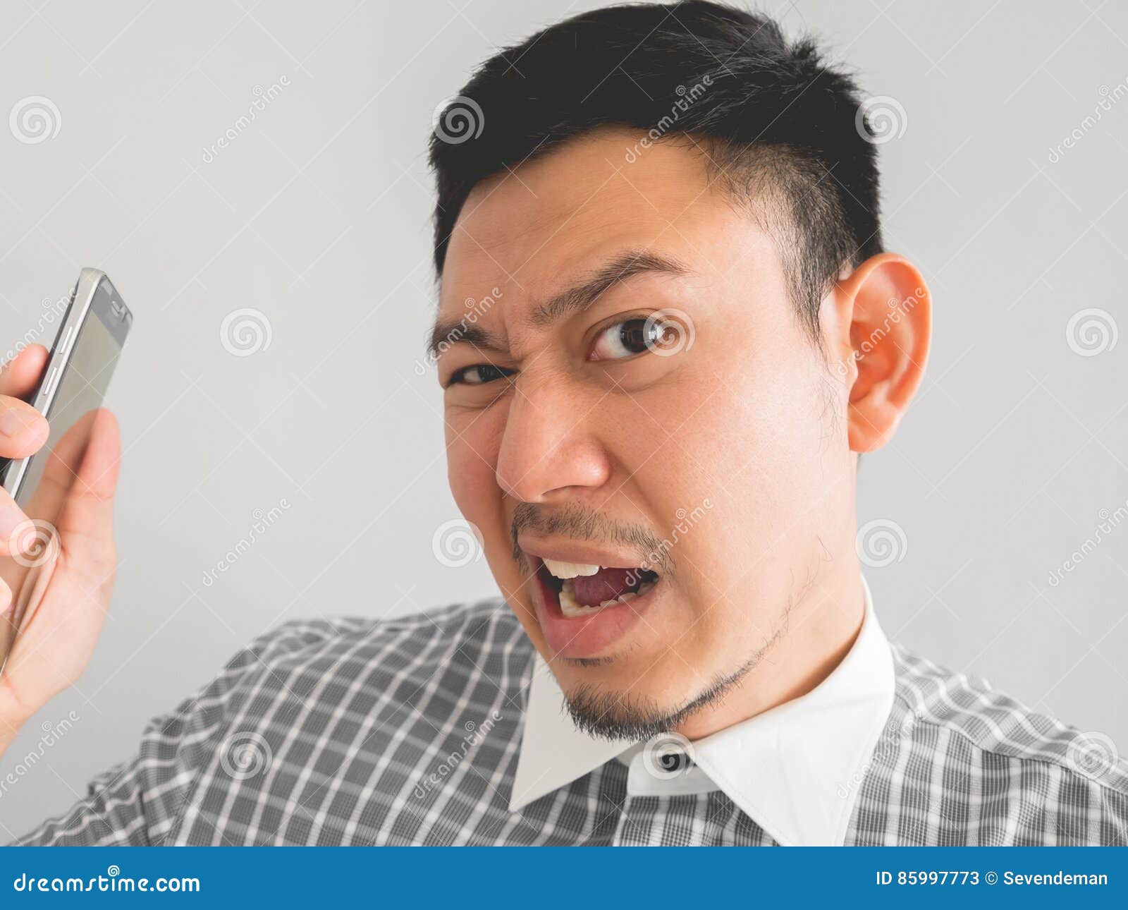 Man Being Shouted from Smartphone. Stock Image - Image of adult ...