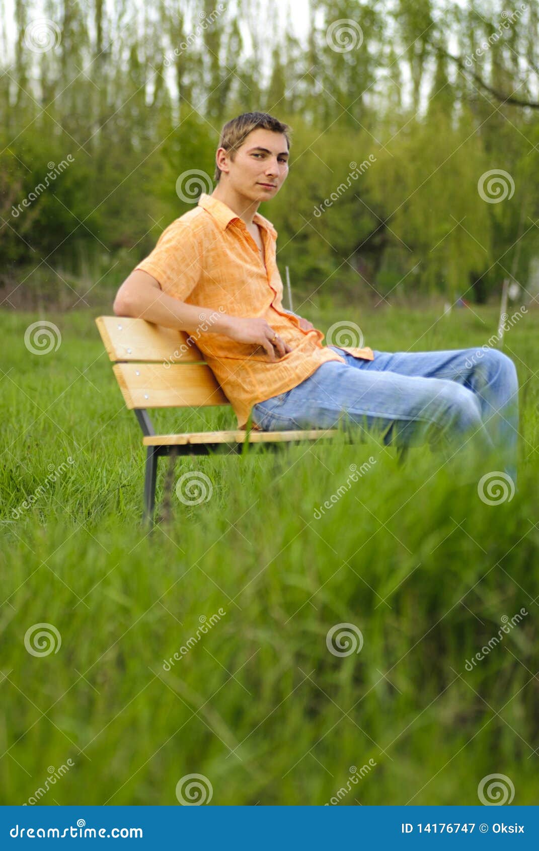 Man on bench stock image. Image of spring, green, look - 14176747