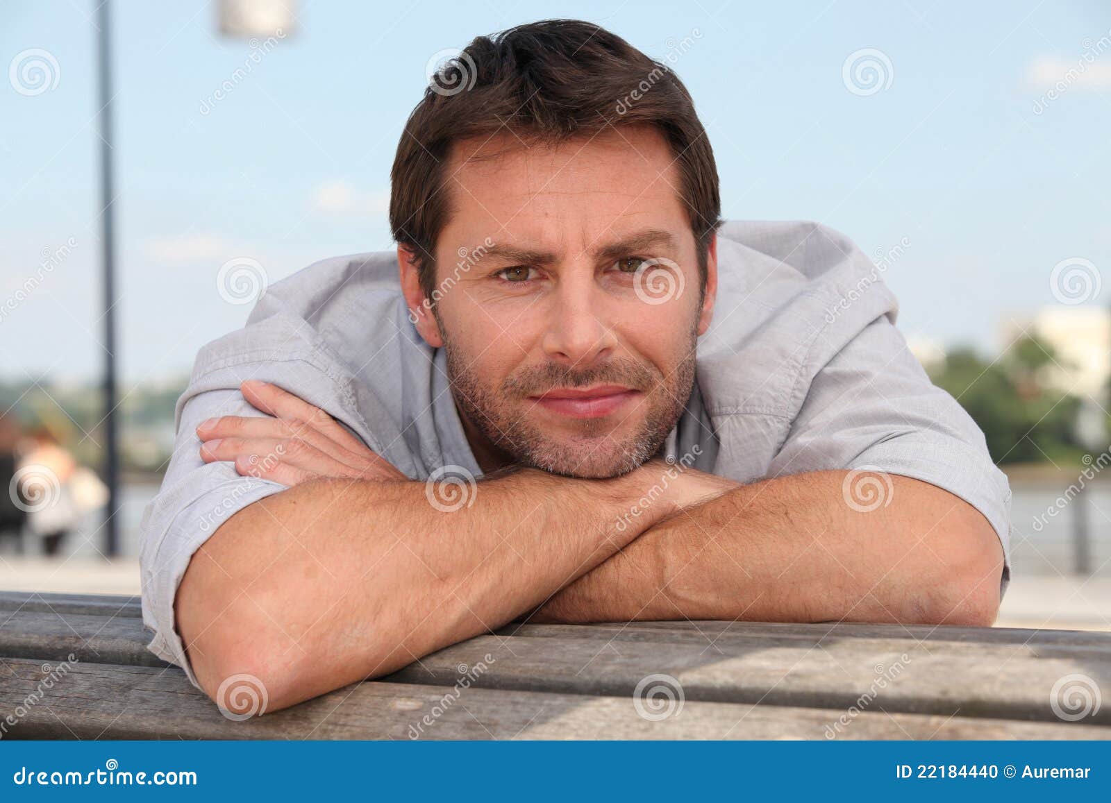 Man on a bench stock photo. Image of front, outdoors - 22184440