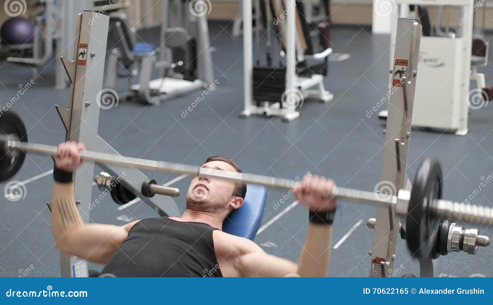 Man bench pressing weights stock video. Video of equipment - 70622165