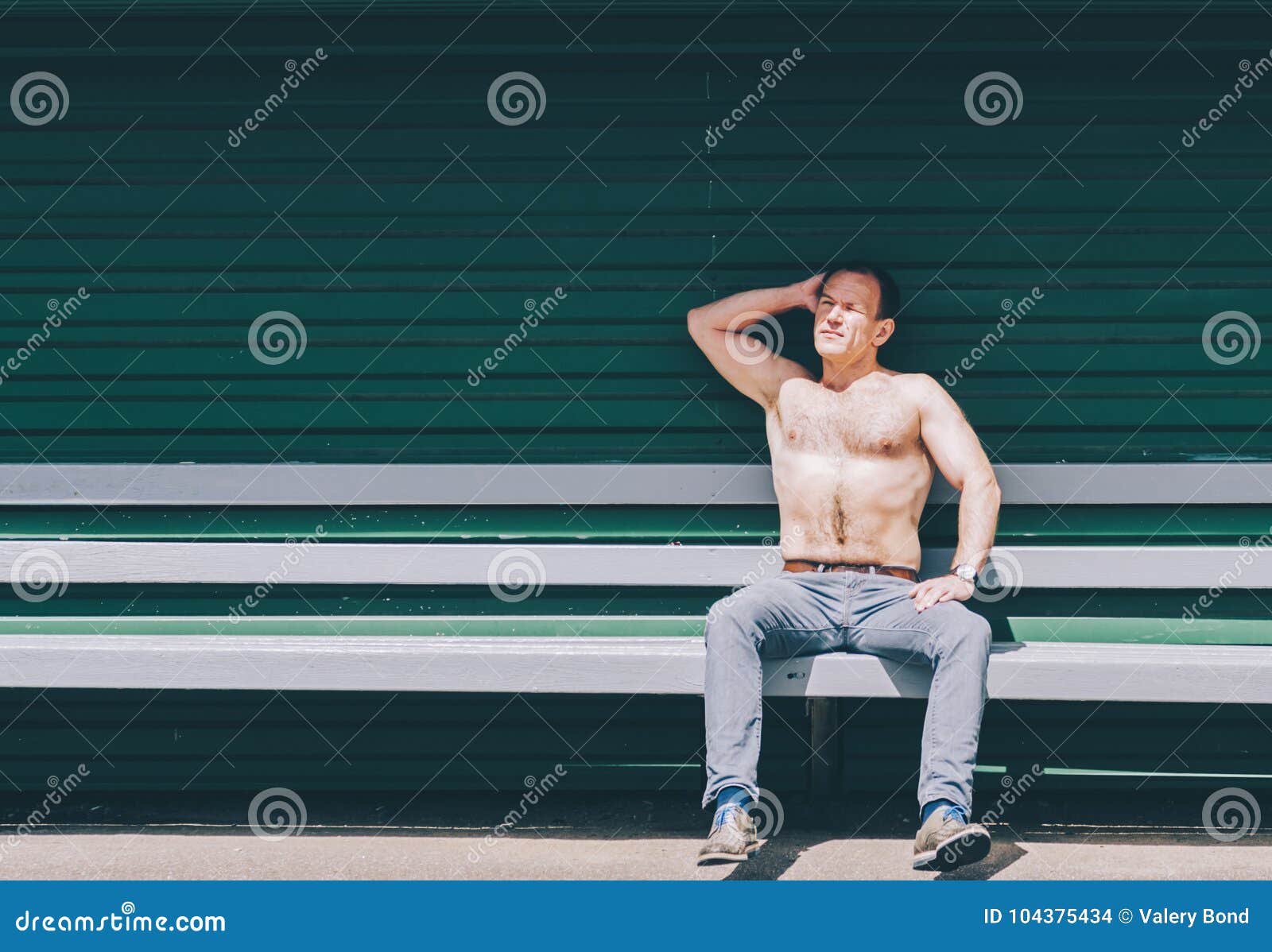 Man on Bench stock photo. Image of people, lifestyle - 104375434
