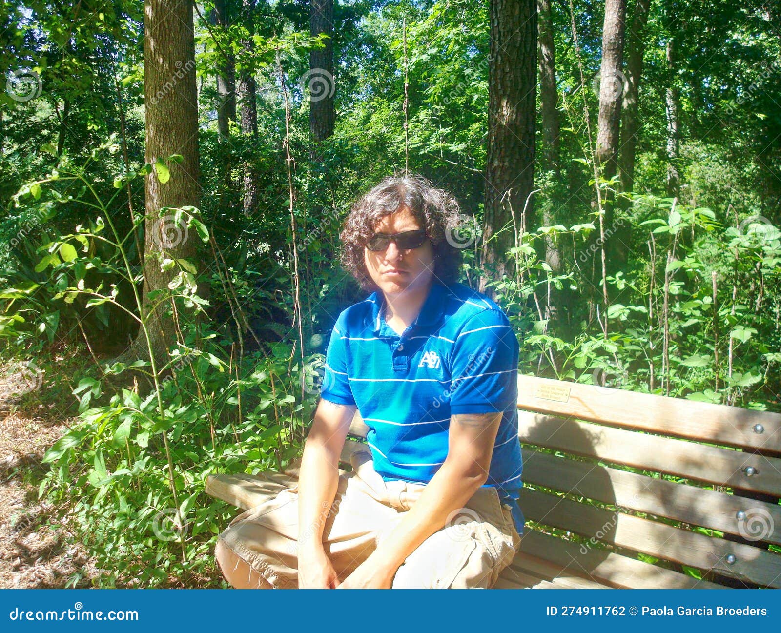 Man on a Bench at Mercer Arboretum Spring Texas United States. Stock ...